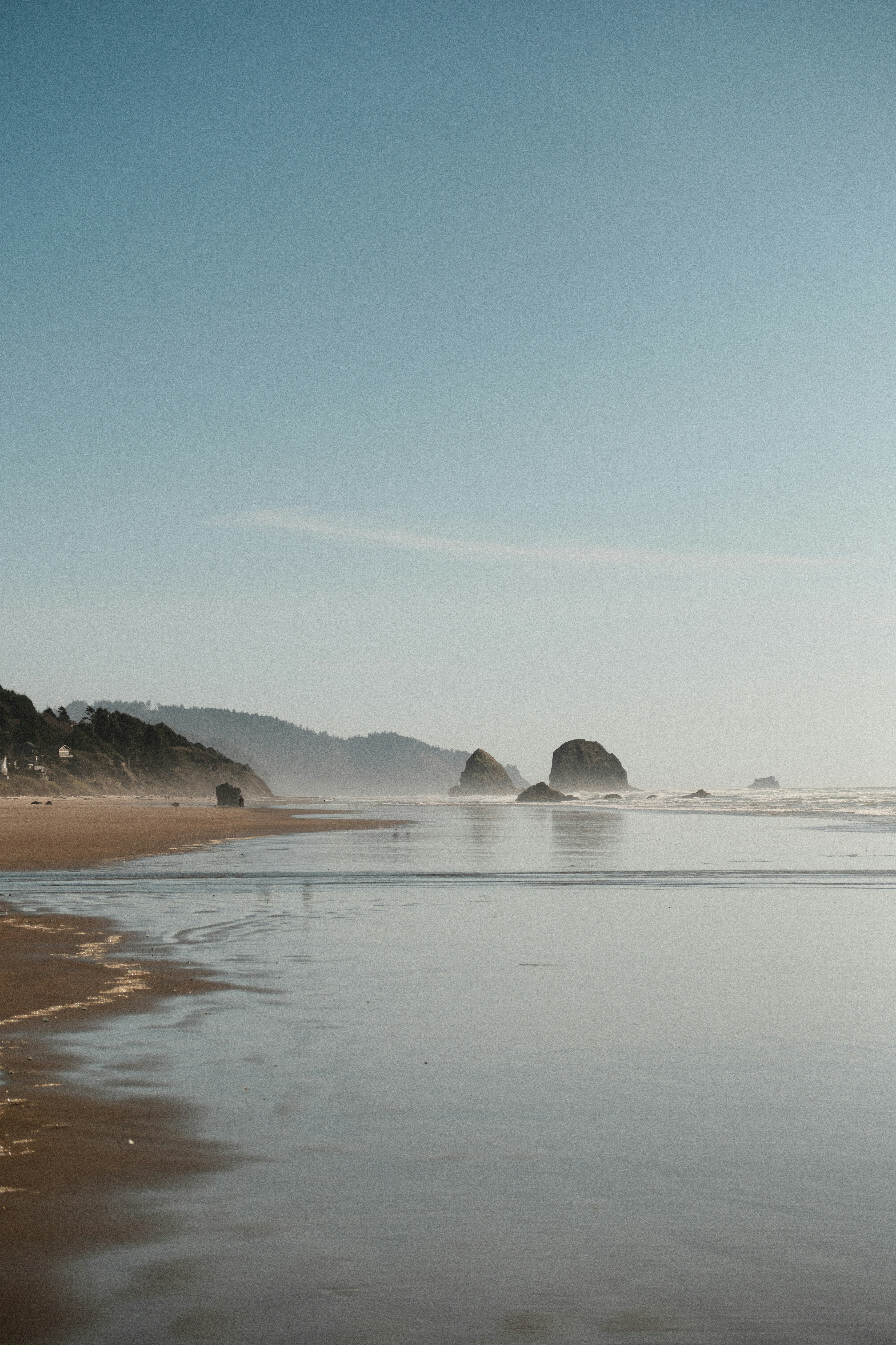 Mist on the Tide: A Quiet Sea with Sea Stacks