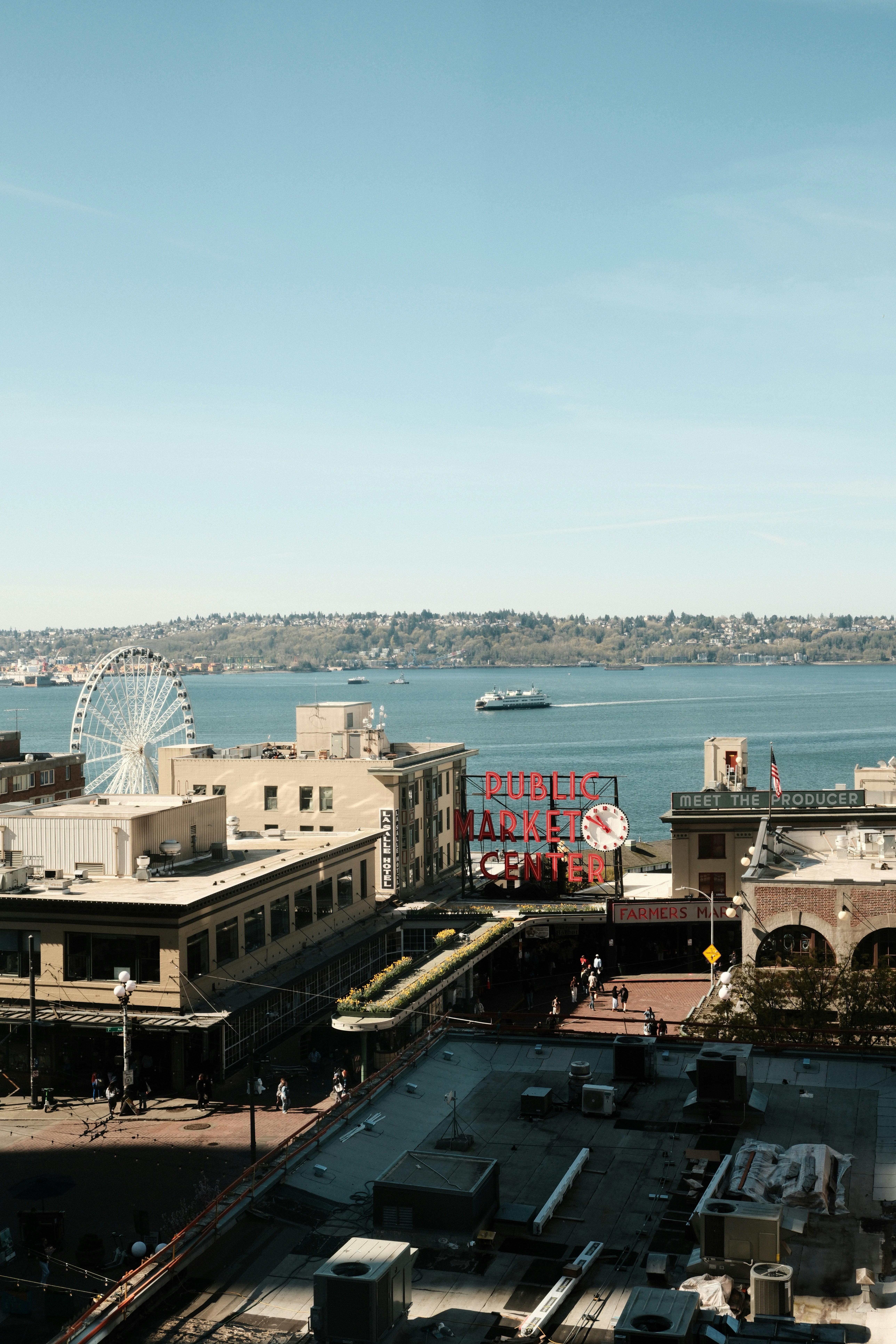 San Francisco Waterfront: Public Market Sign Amidst Rooftop Shadows