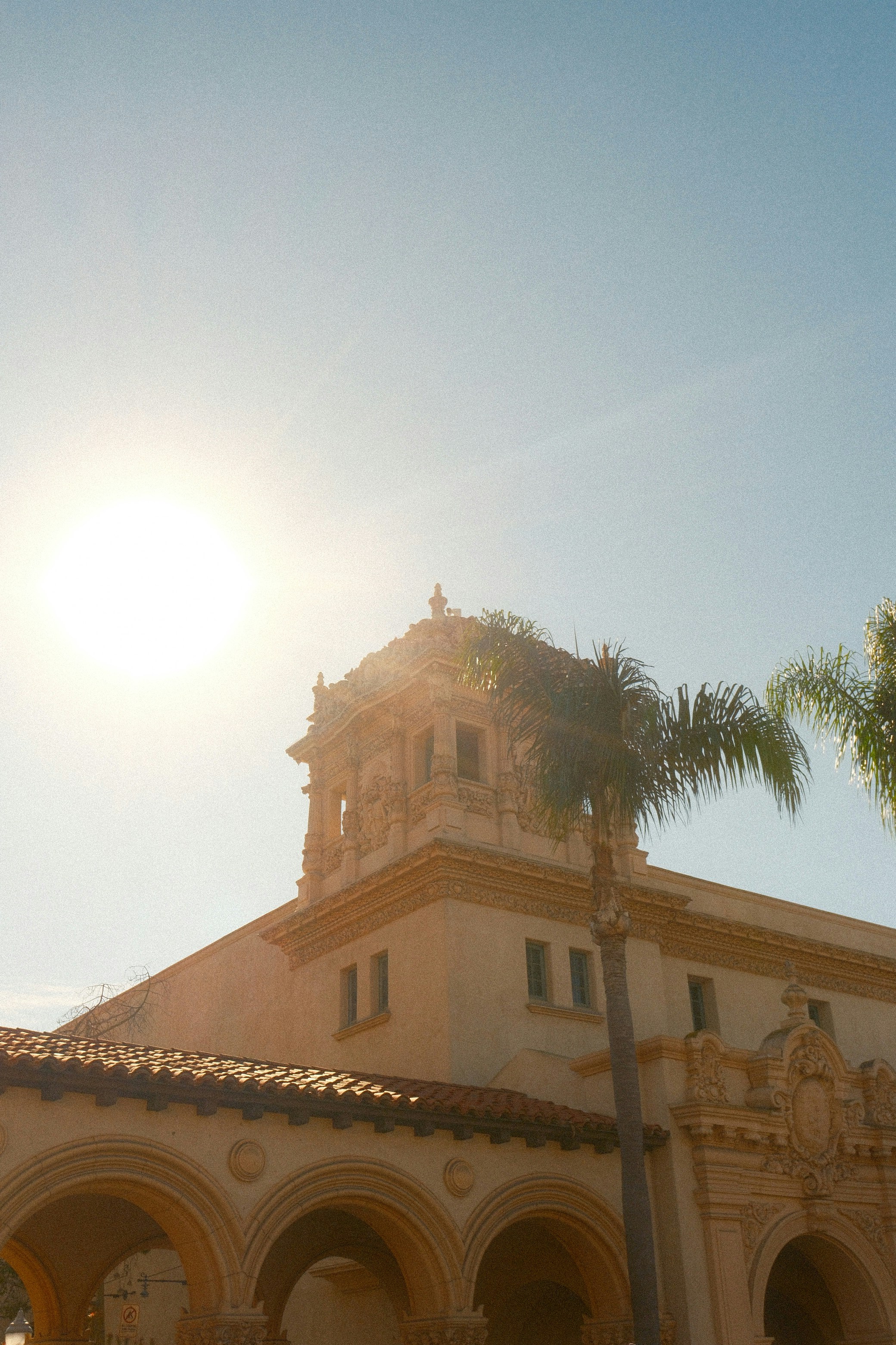 Sunlit Bell Tower: A Warm Morning at the Spanish-Portuguese Style Plaza