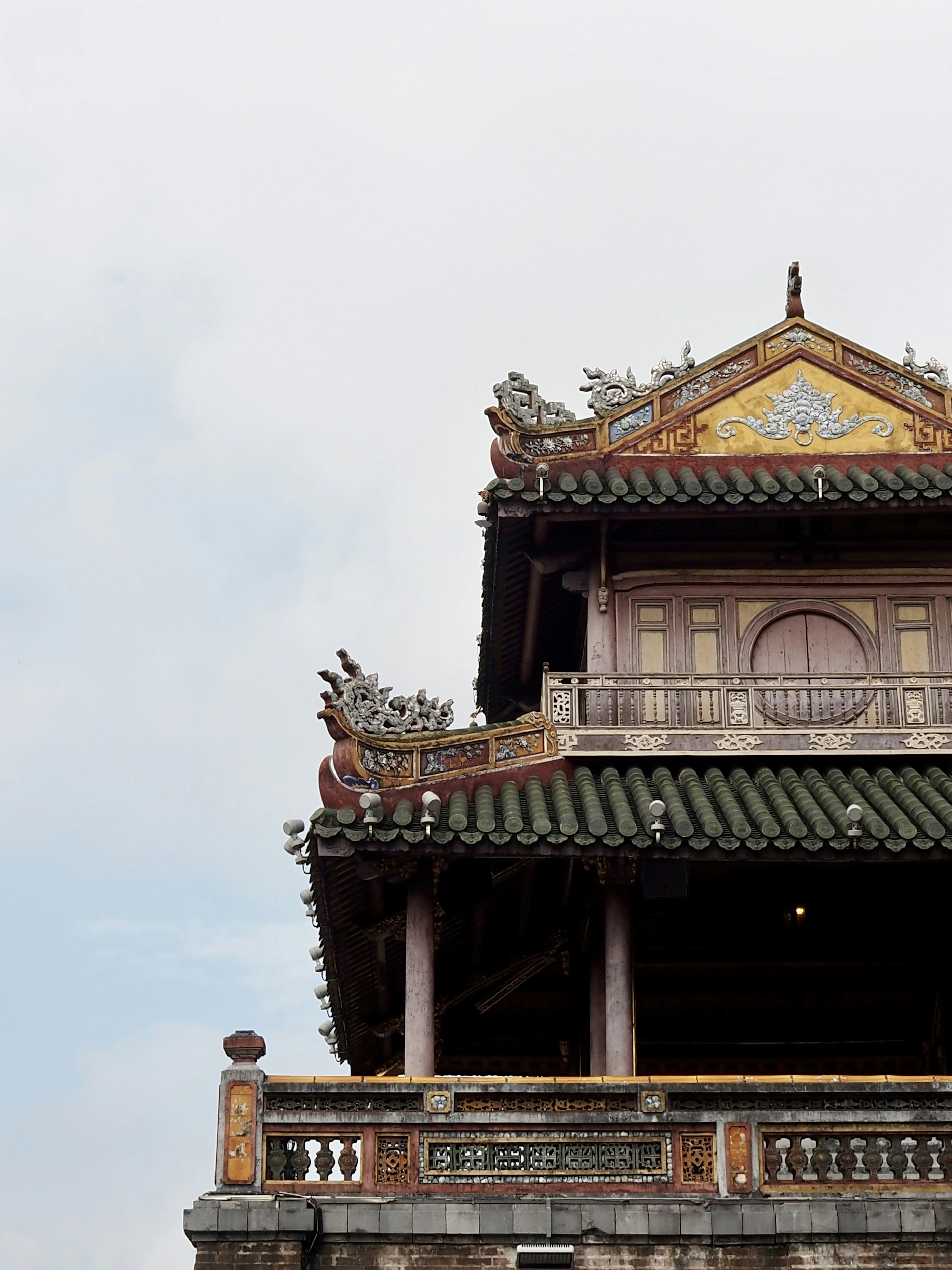 Dragon Crest Over Carved Eaves: A Corner Temple Rooftop