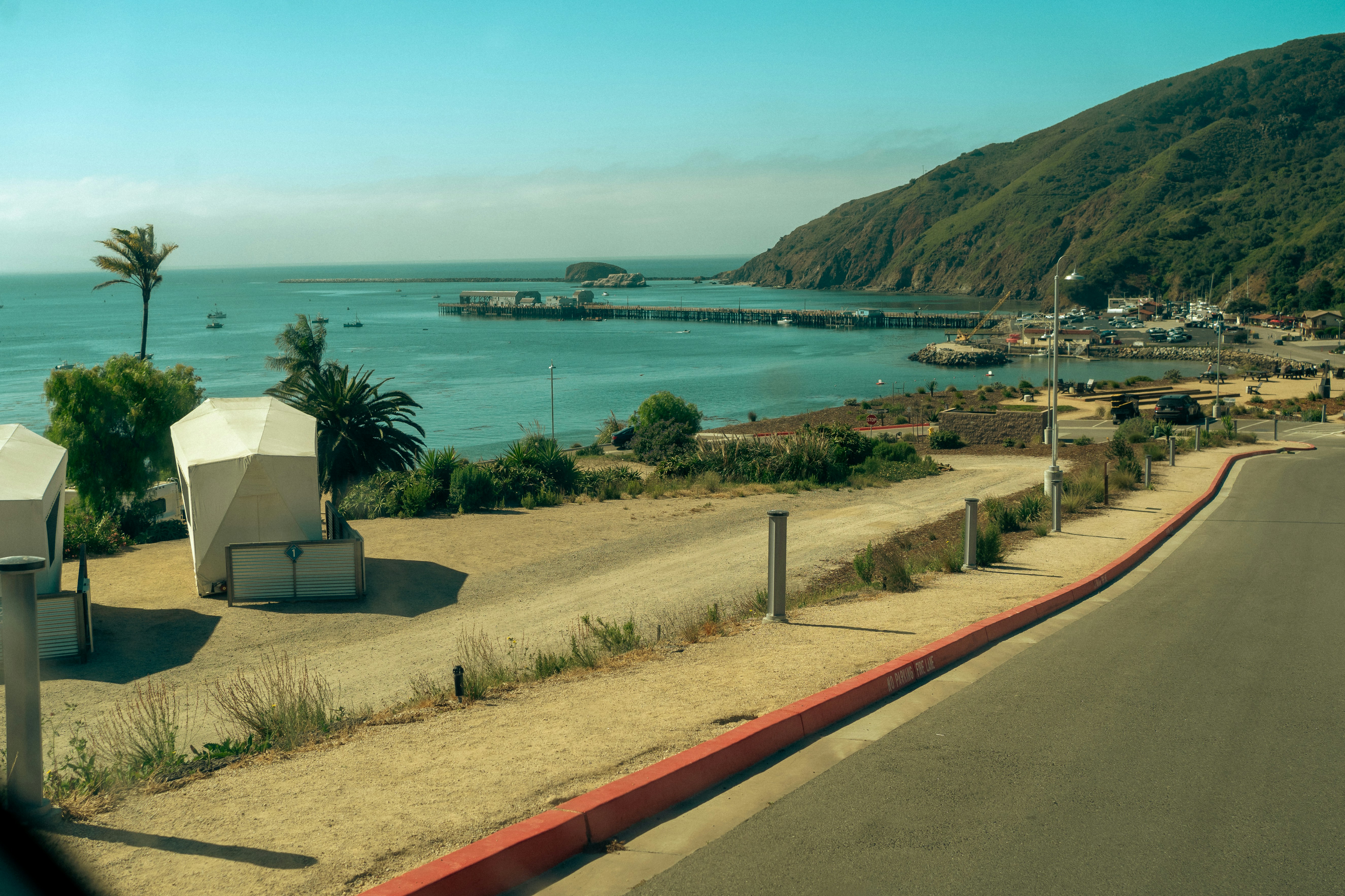 Coastal Roadside Toward the Pier and Hills