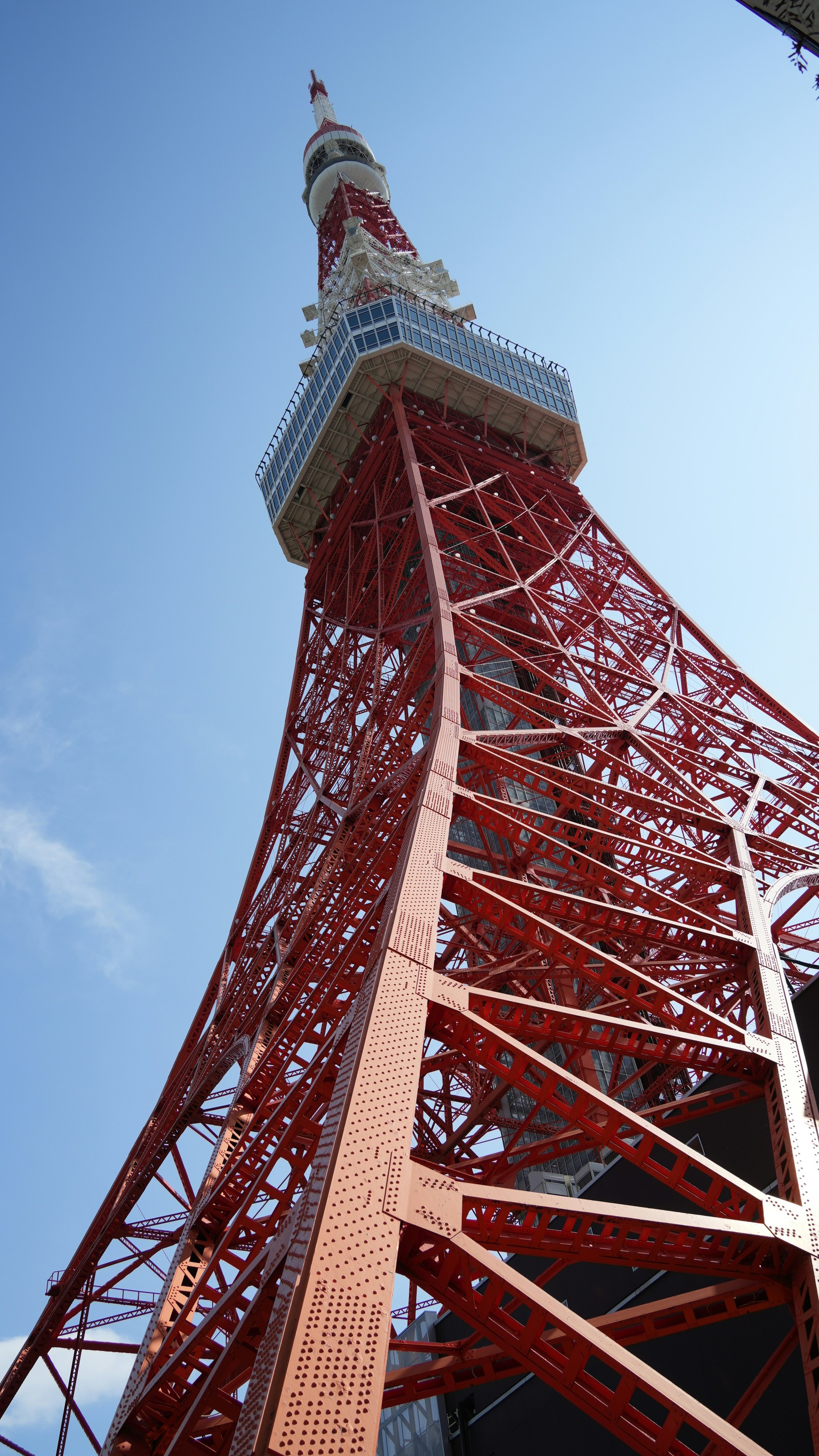Tokyo Tower up close: lattice rays and sapphire sky