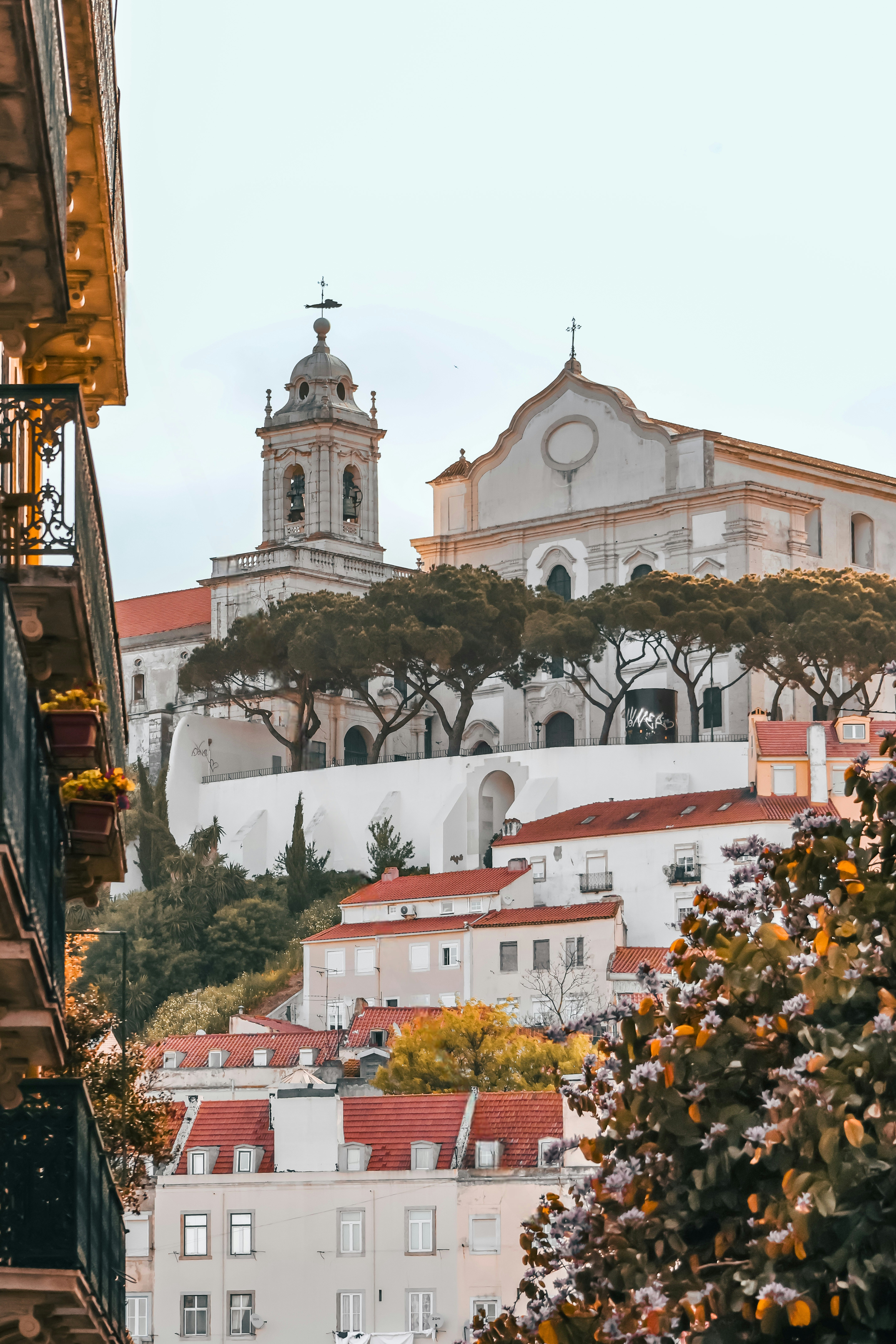 Hilltop Churchscape: White Facades and Red Rooftops