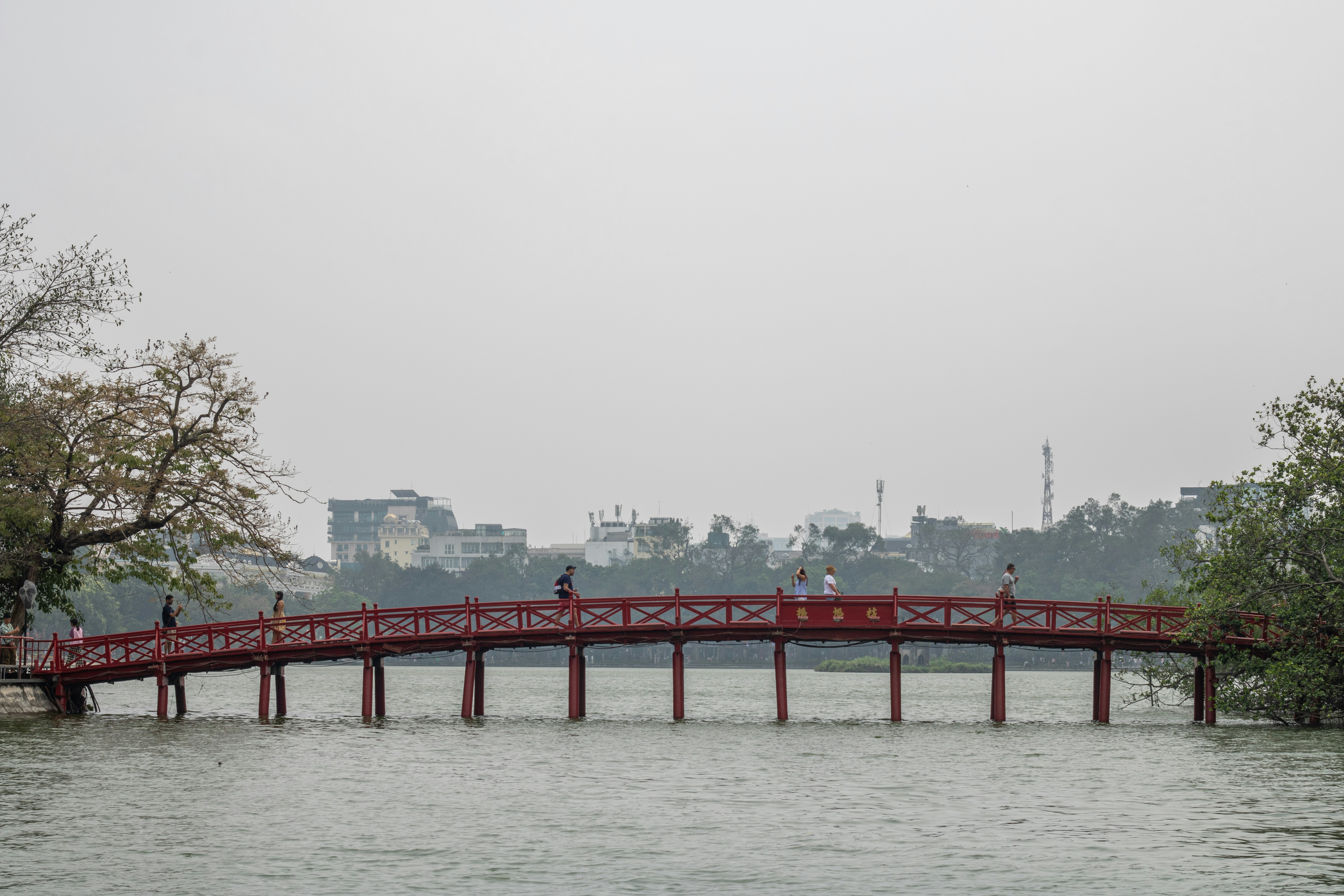 Red Bridge Over Calm Waters: A Quiet Moment on the Long Walk