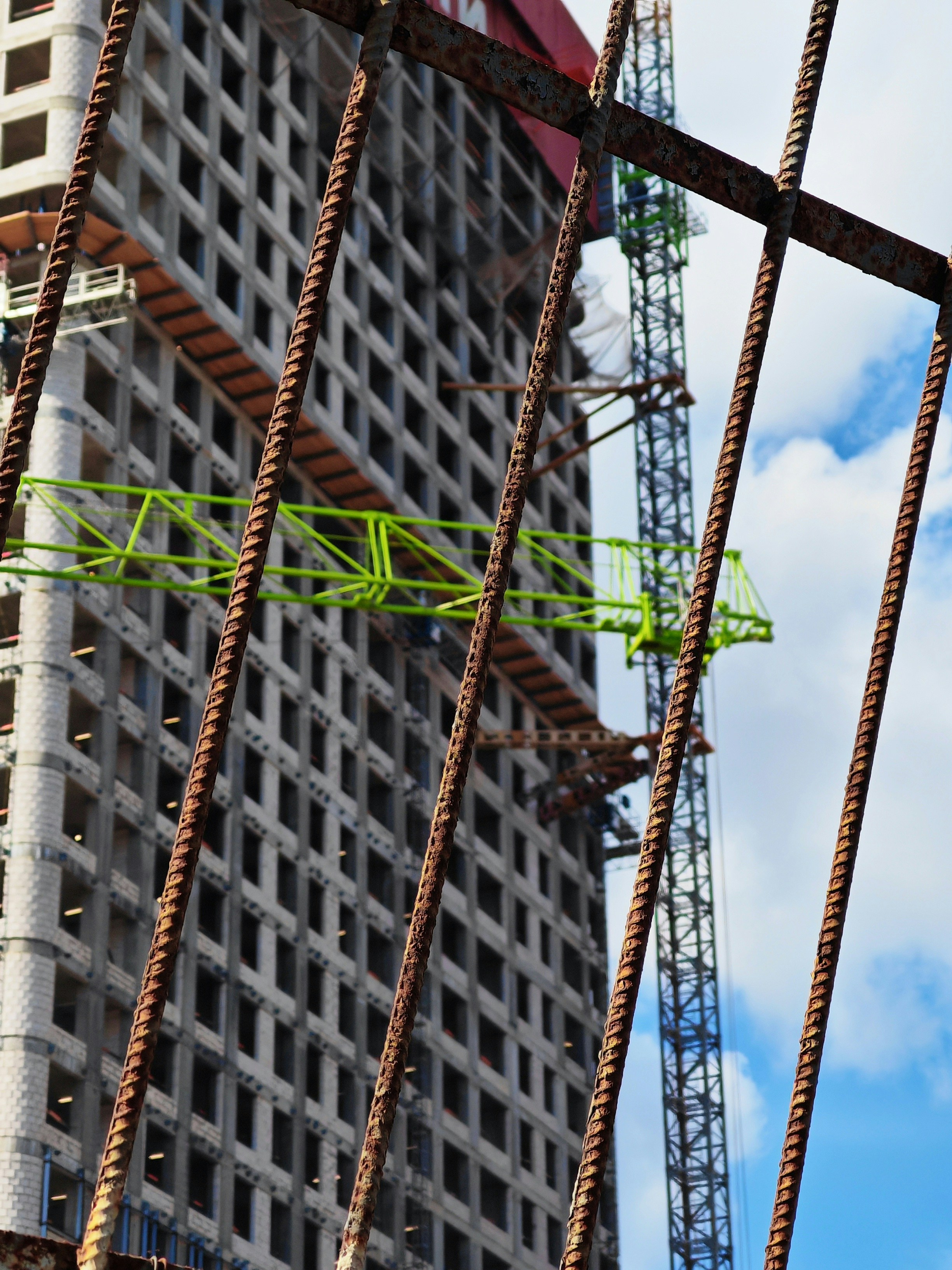 Rusted Rebars Framing a Skyward Canvas