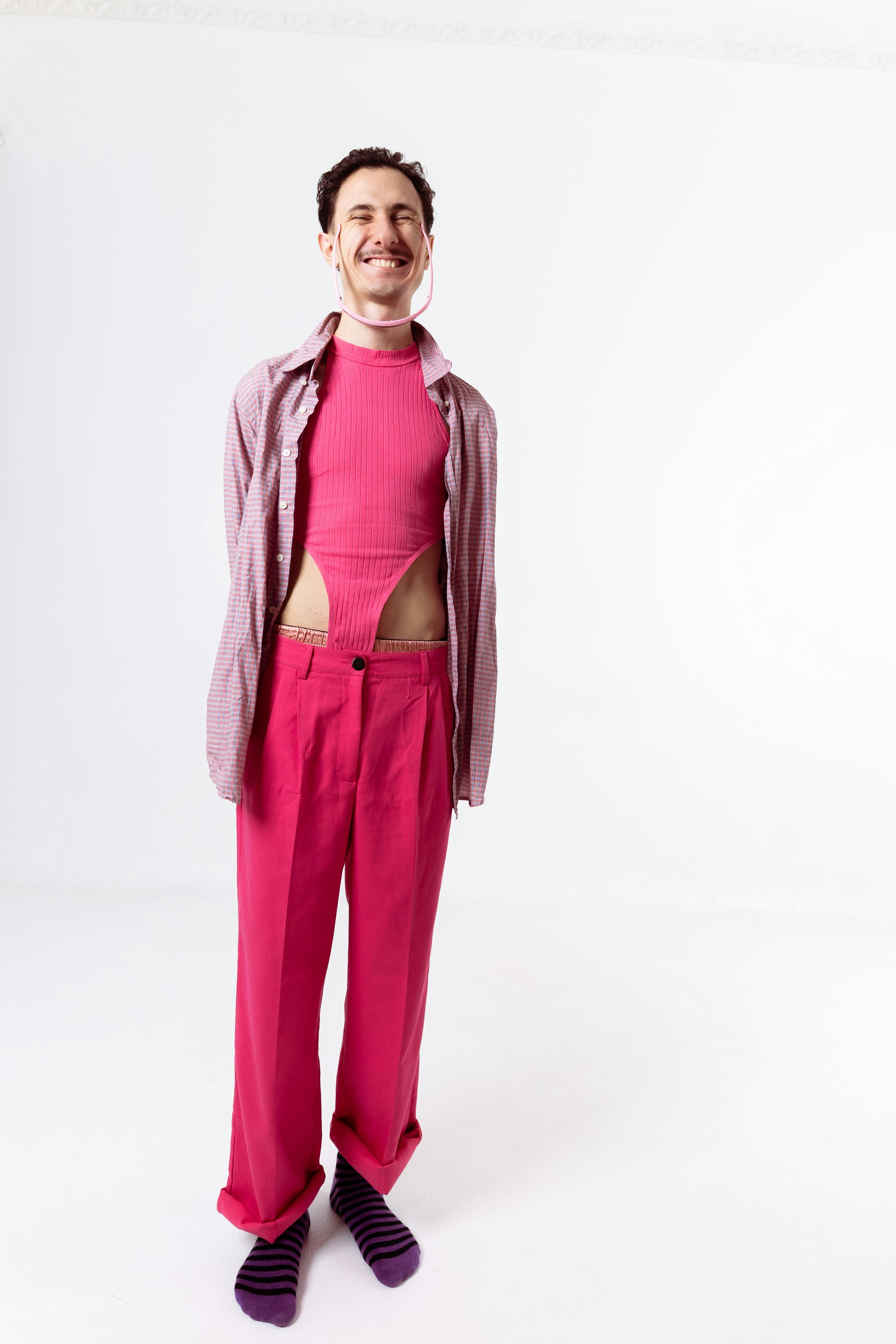 Bold Magenta: A Playful Portrait in Colorful Attire