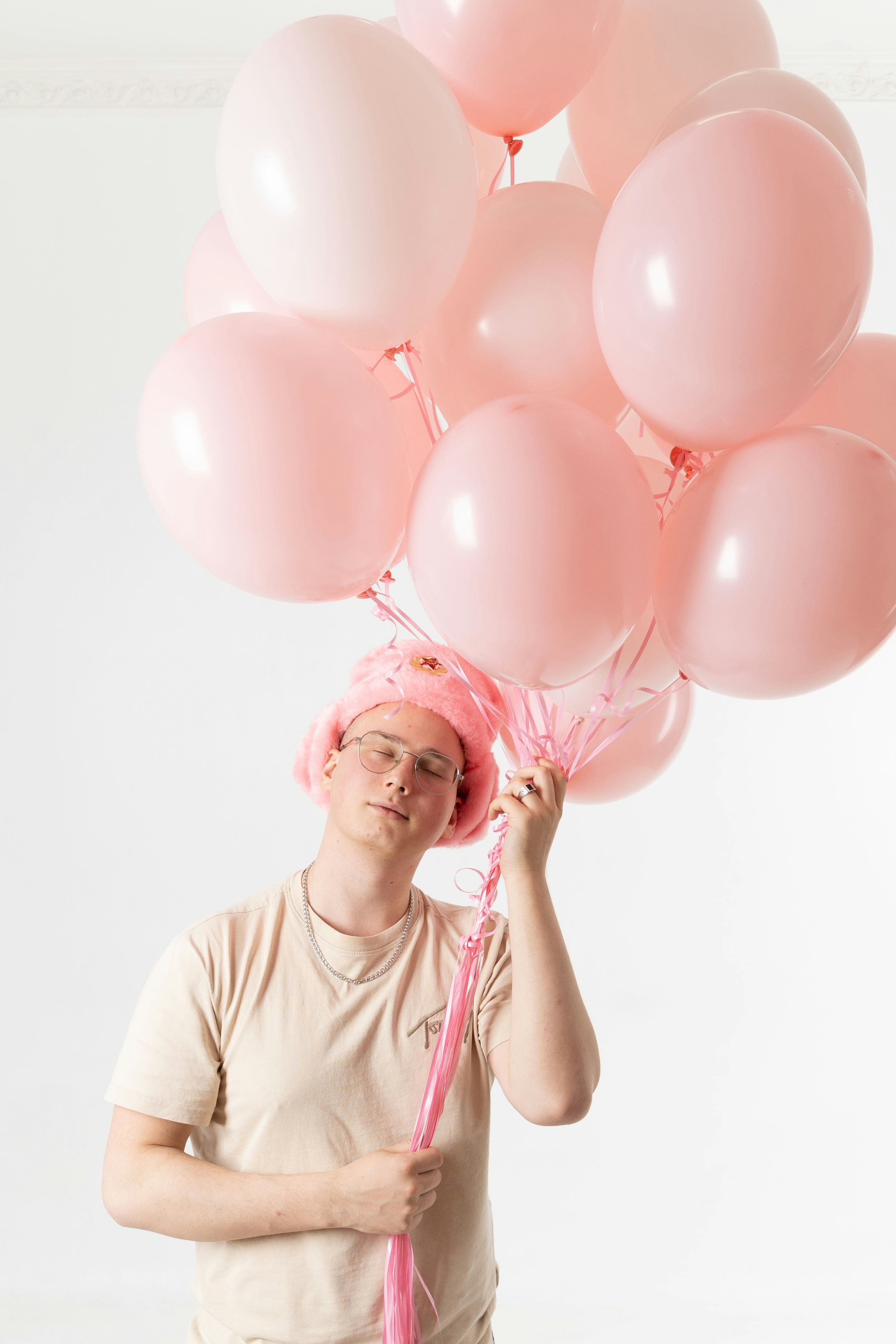 Balloon Whisperer: A Moment of Pink Quiet