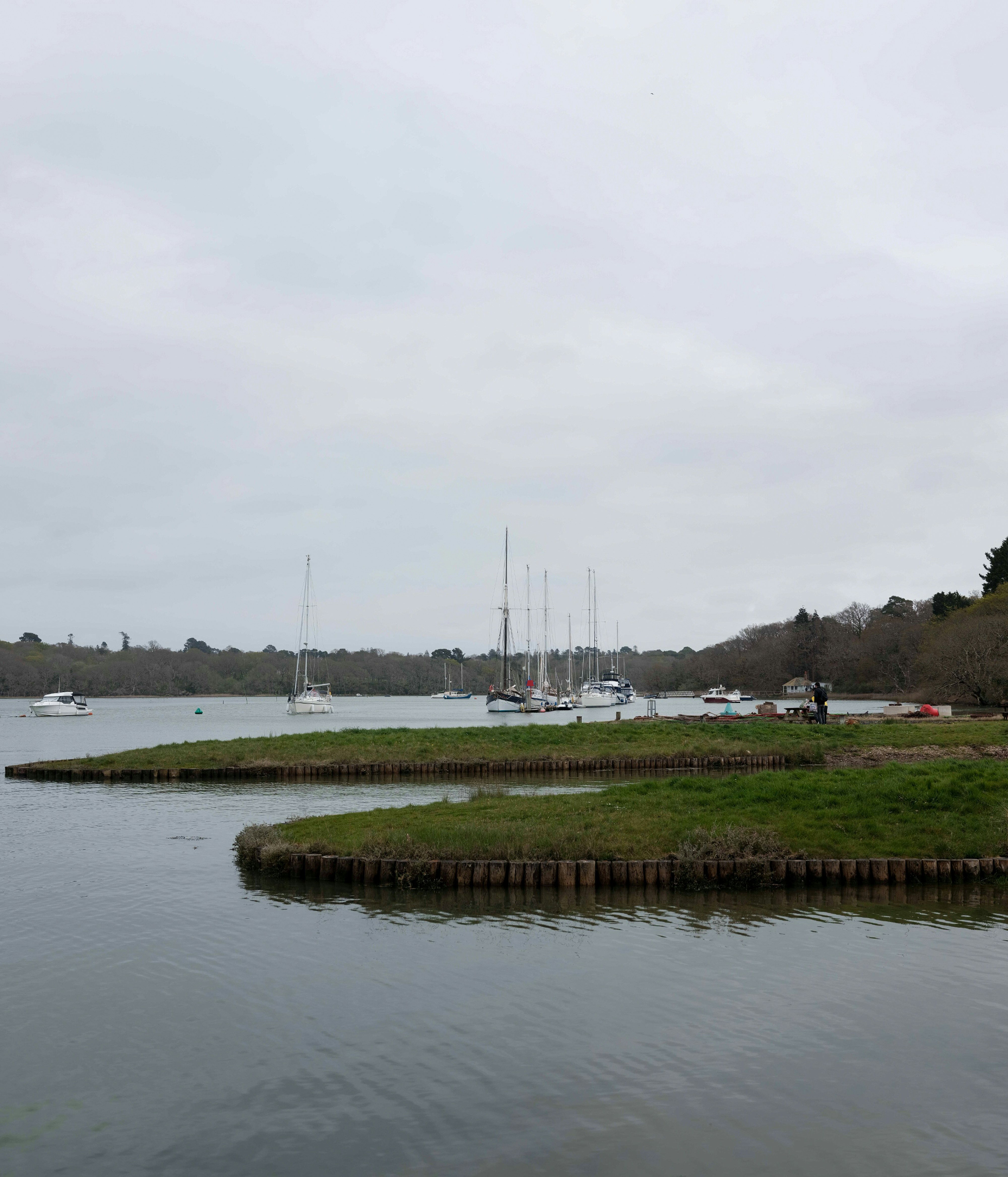 Harbor at Dusk: Boats and Gentle Tides Framing a Quiet Waterfront