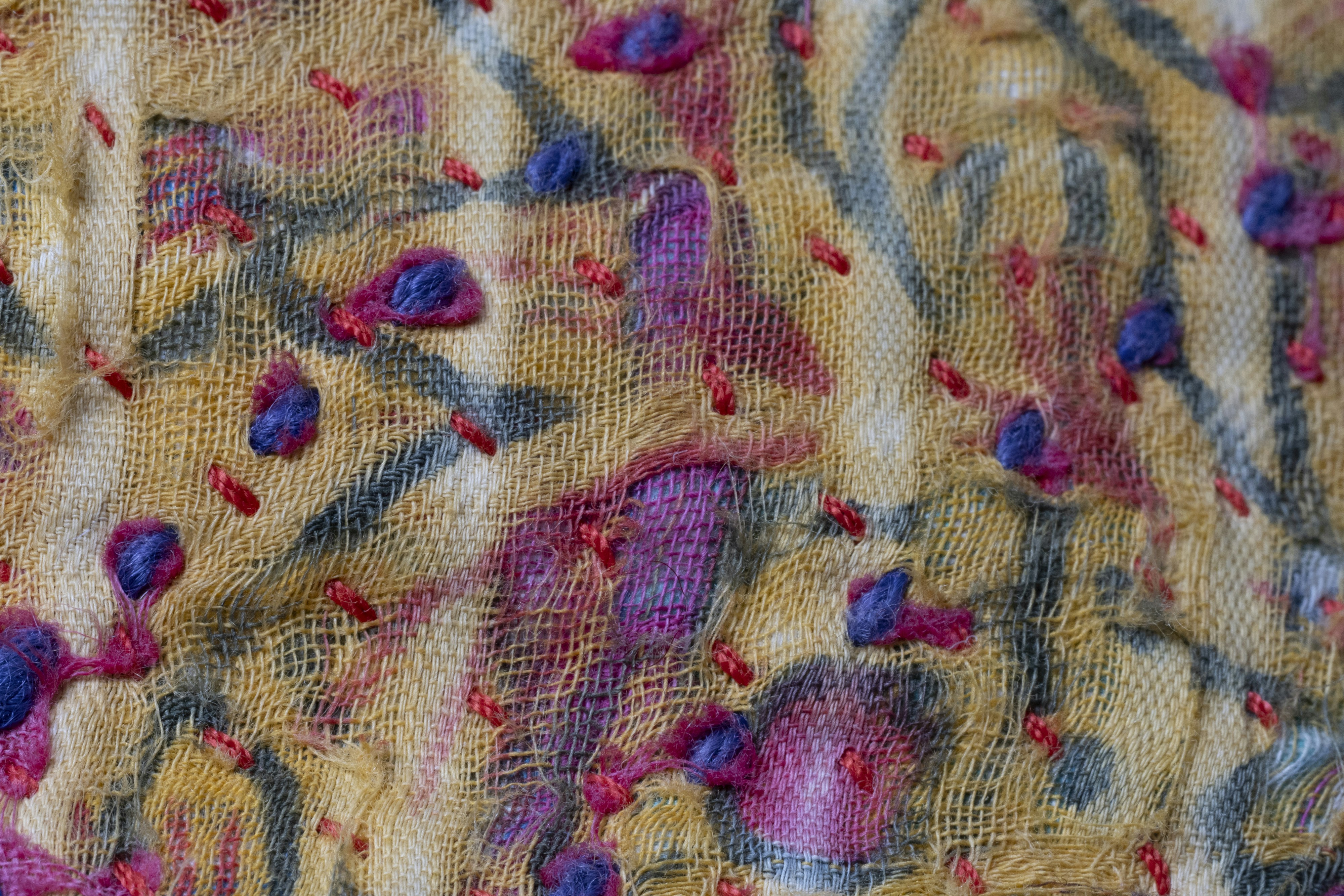 Threads of Color: A Bursting Textile Mosaic