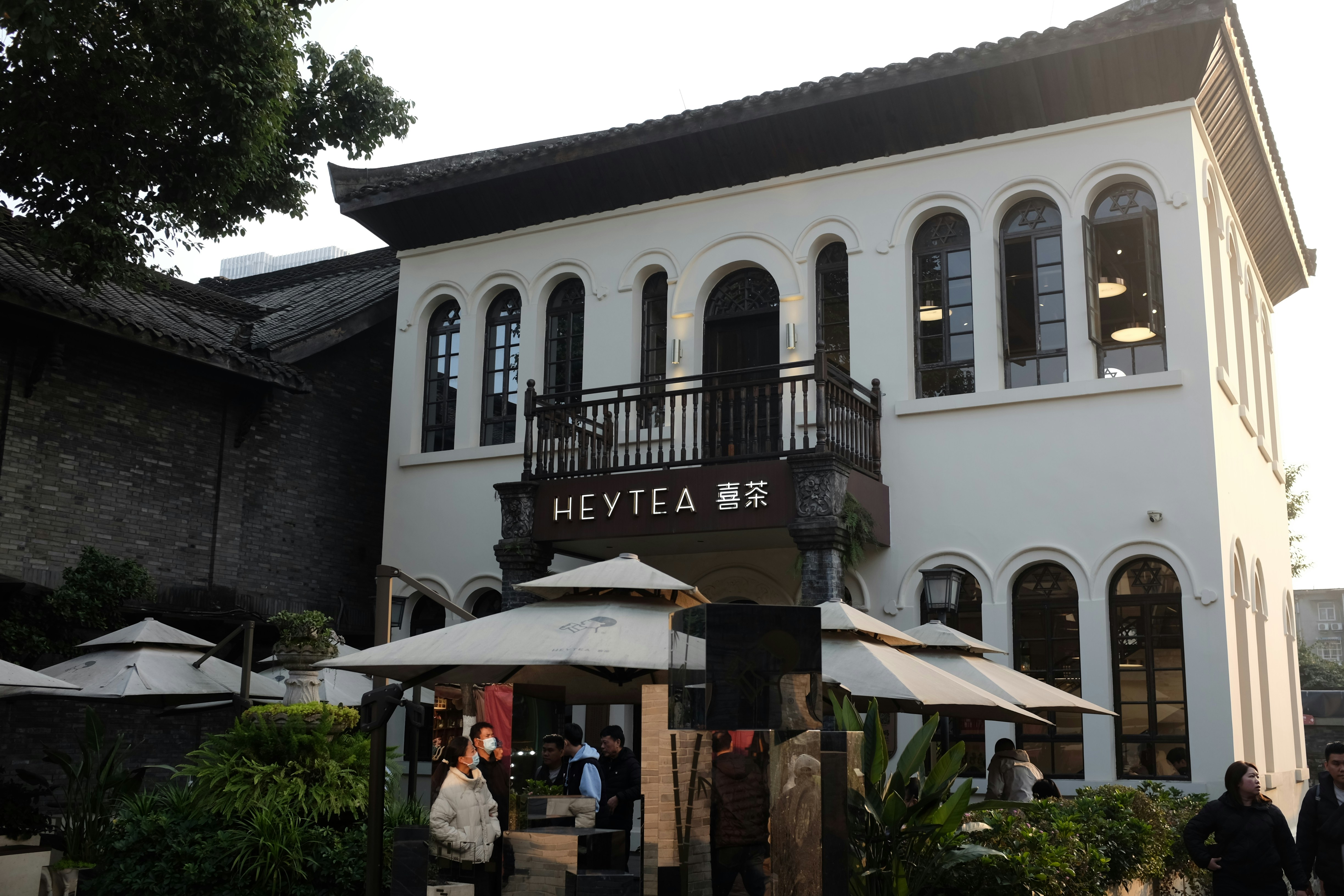Heytea House in Arched-Window Facade Oasis