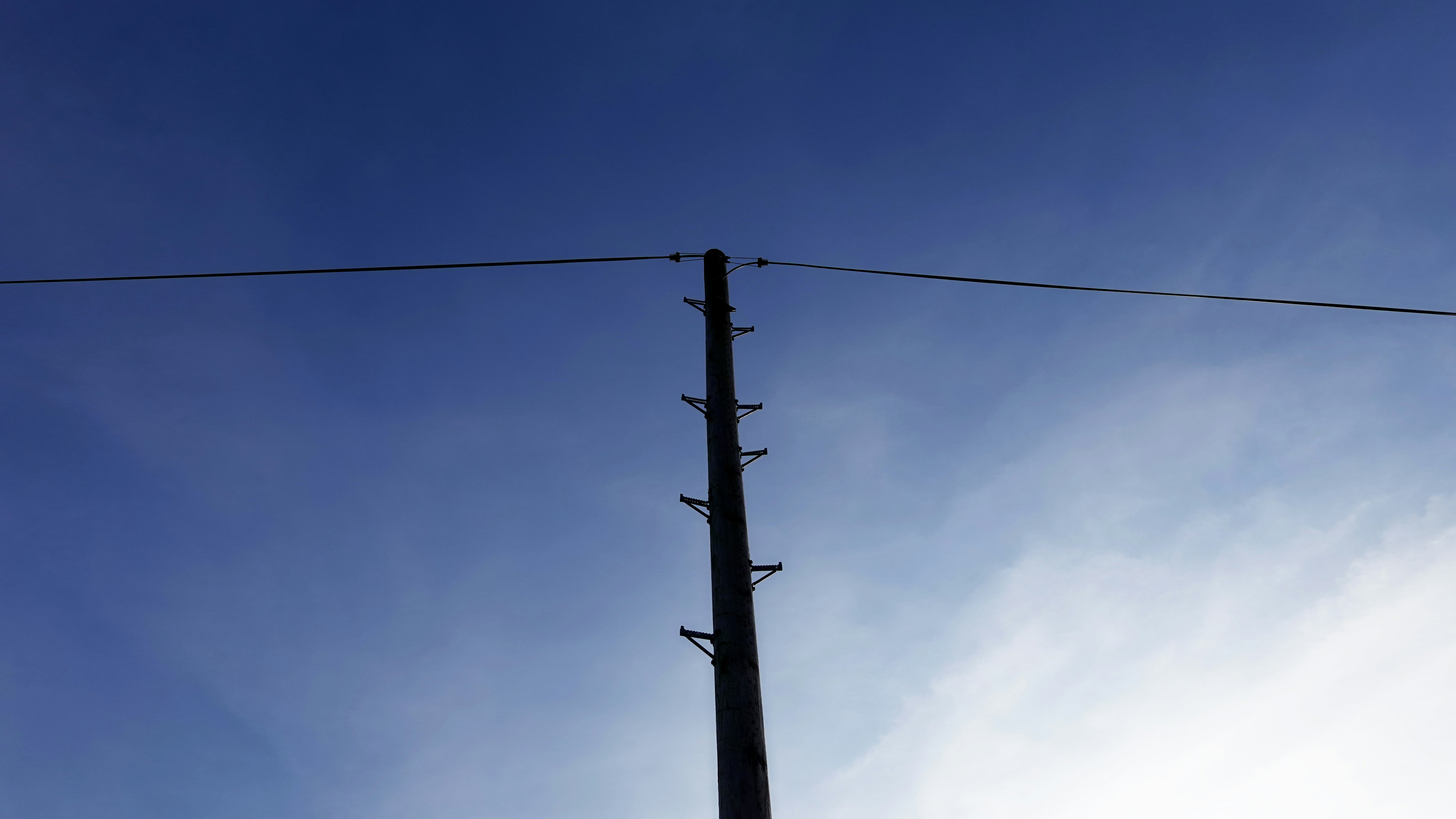Pole of Silence: A Single Tower Against a Vast Sky
