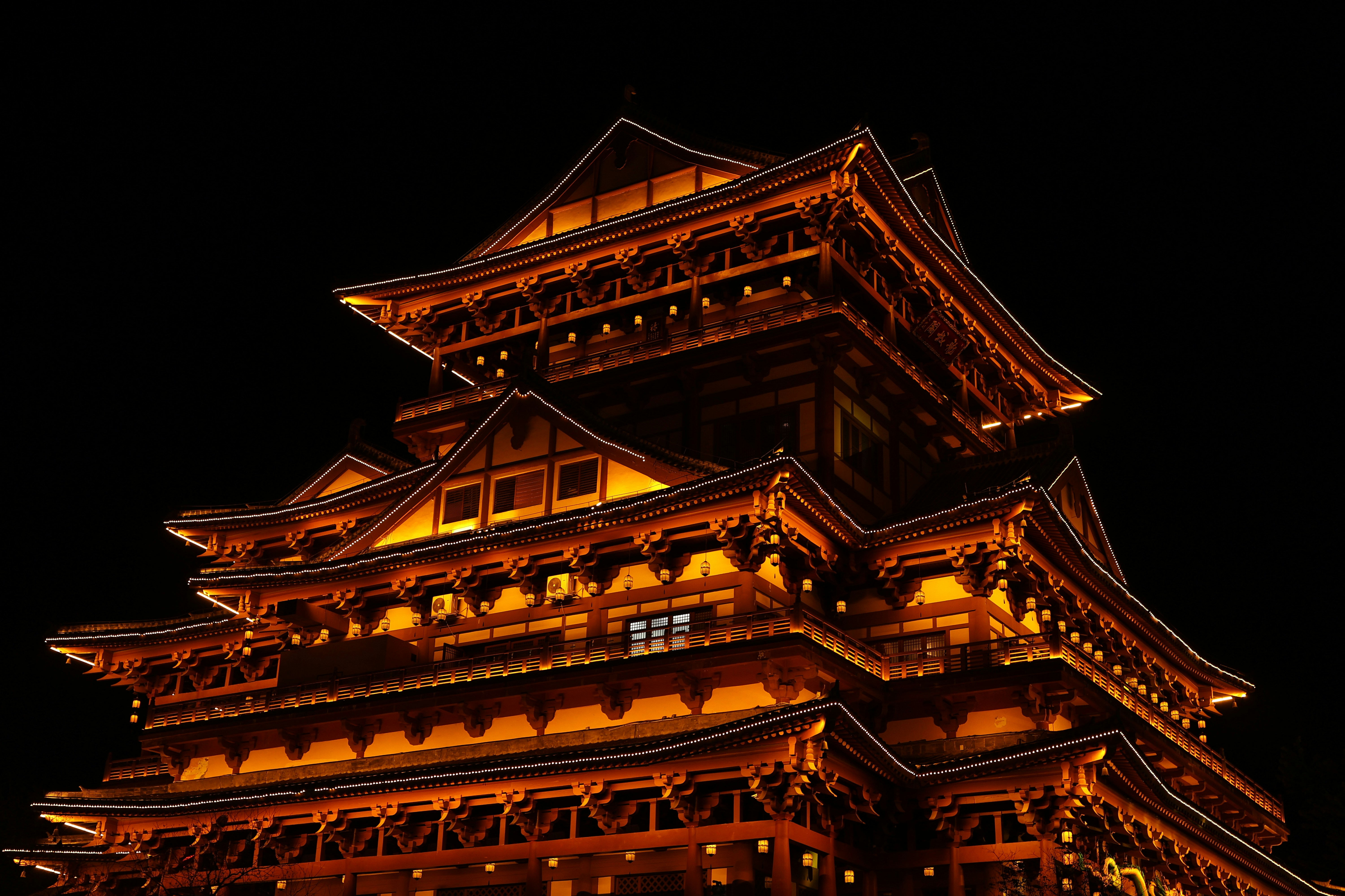 Night Ember: A Lanterned Pagoda Reaches for the Sky