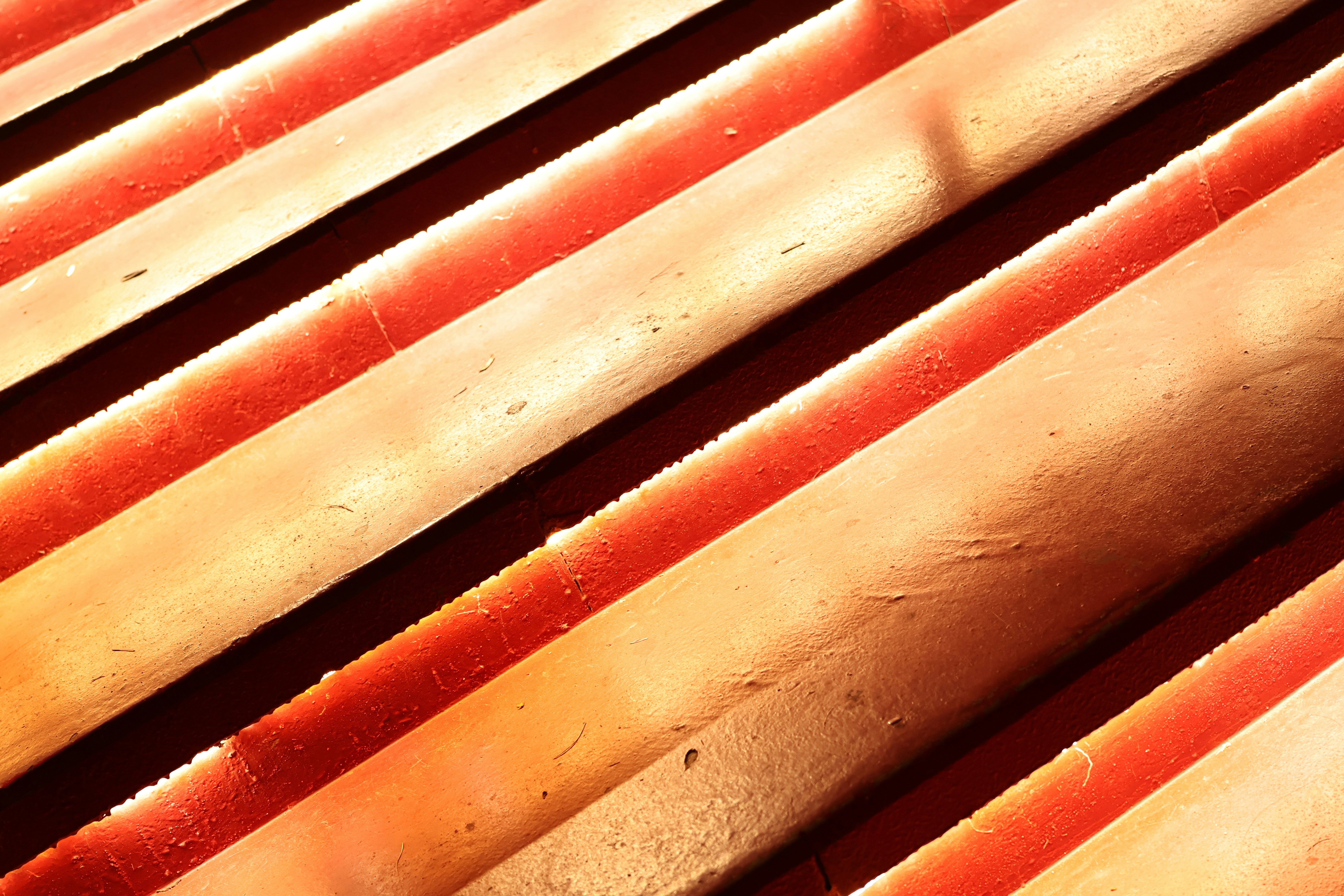 Diagonal Ribbons of Sunset: Warm Striations in Painted Steel