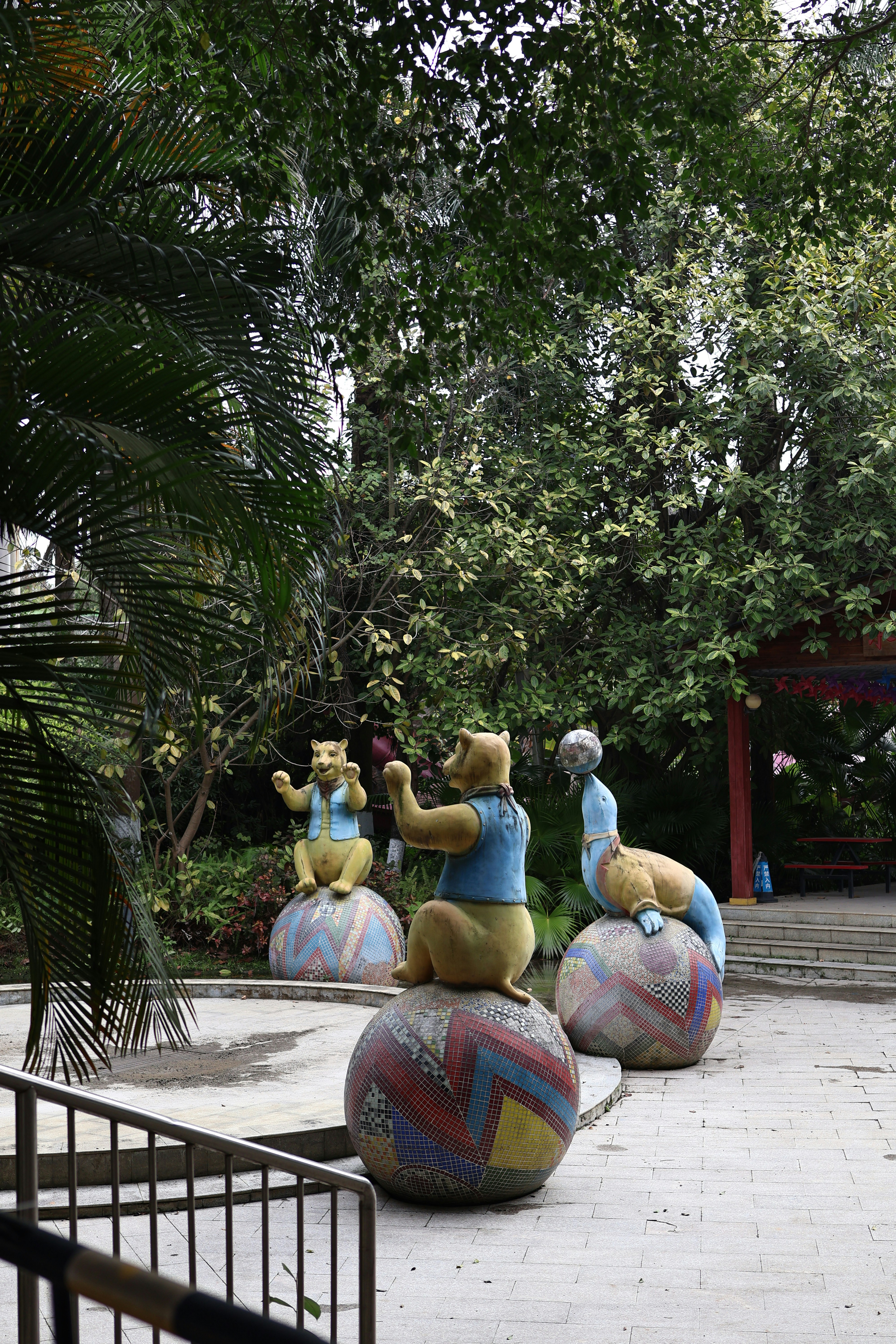Playful Bears on Painted Orbs: A Curious Garden Parade