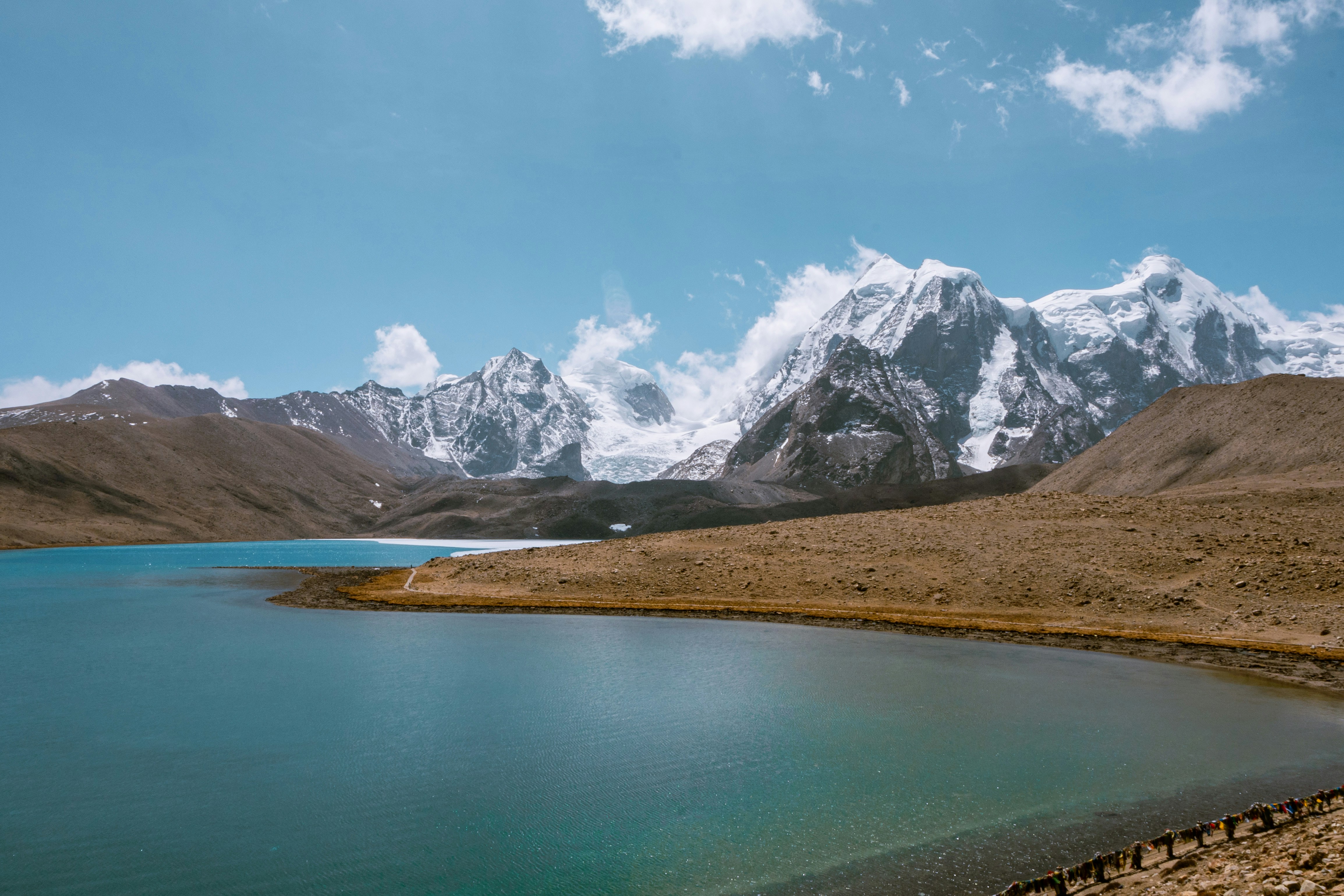 Glacial Mirror: A Lacustrine Basin Against Alpine Giants