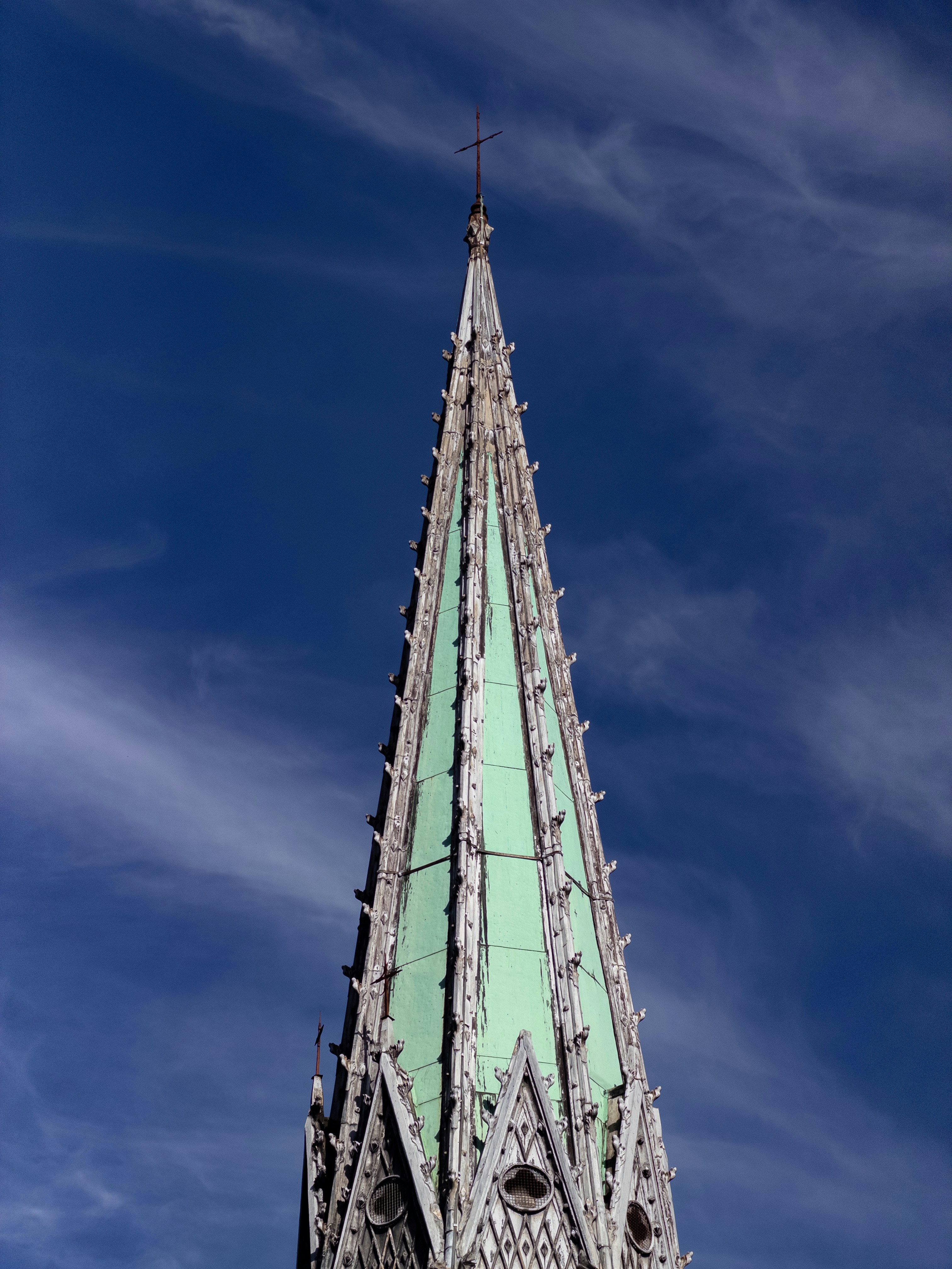 Spire Piercing the Sky: A Gothic Needle Reaching Above the City