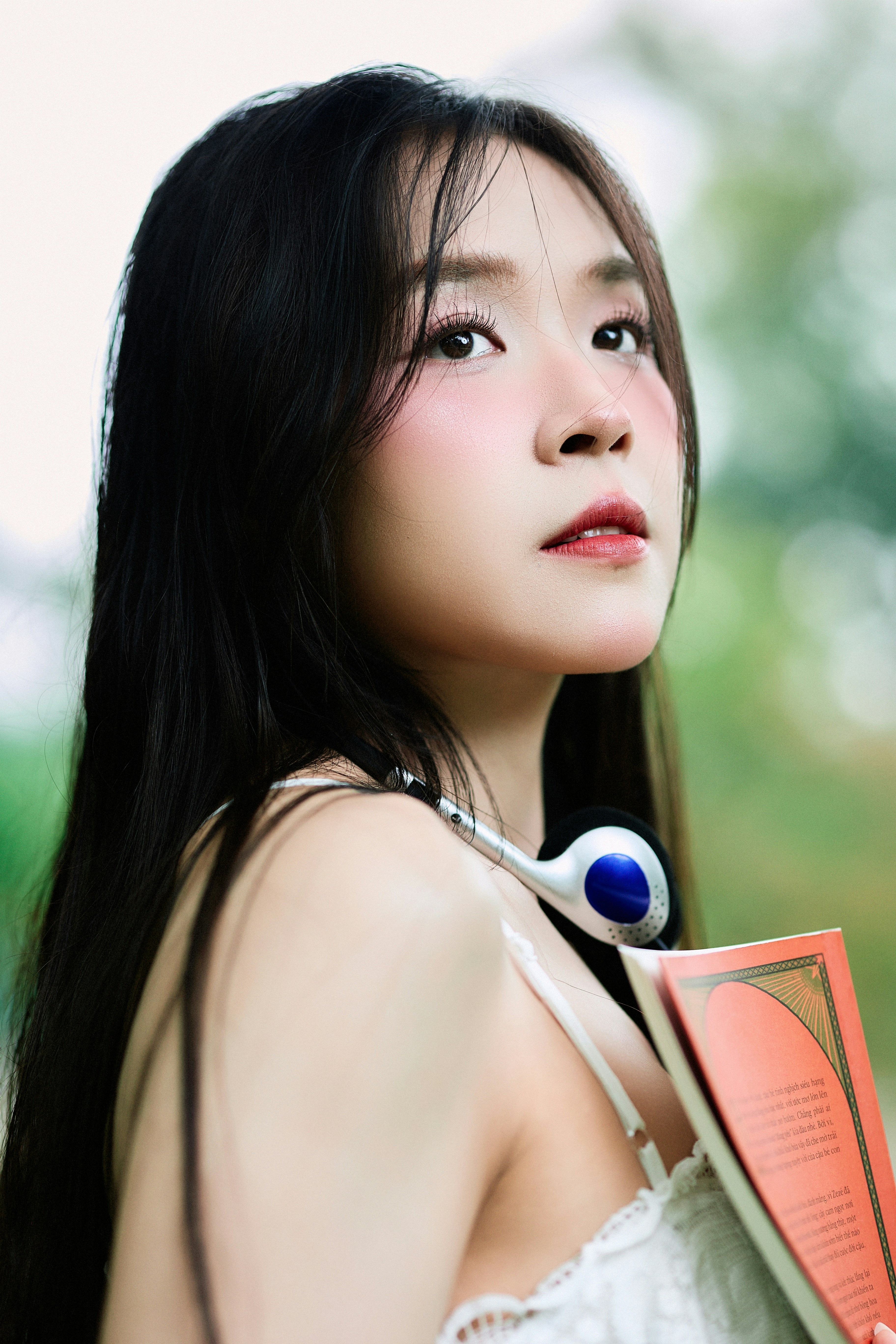  Portrait of Quiet Confidence: A Close-up with Soft Backdrop
