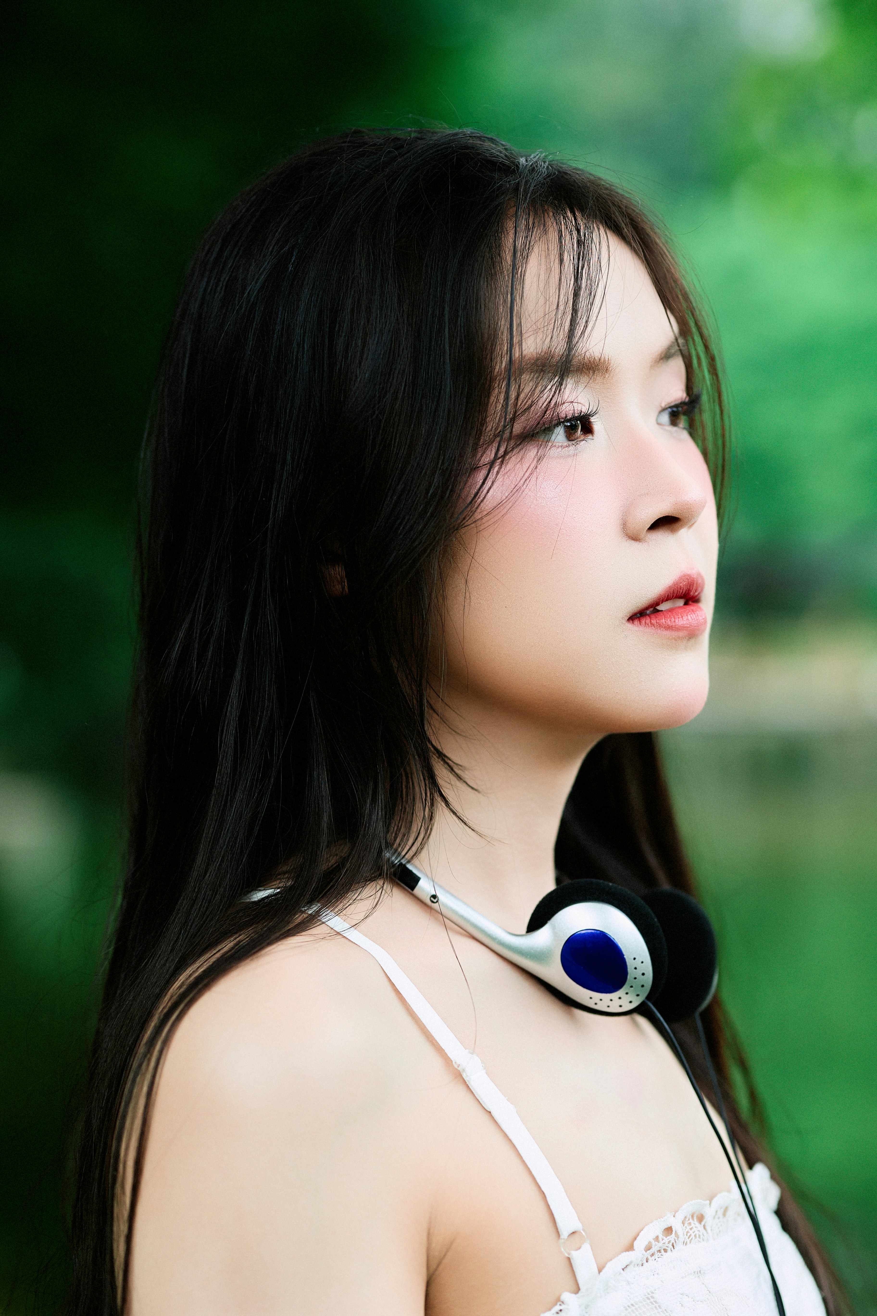 Soft Focus on a Gentle Gaze: Portrait of a Woman by the Lake