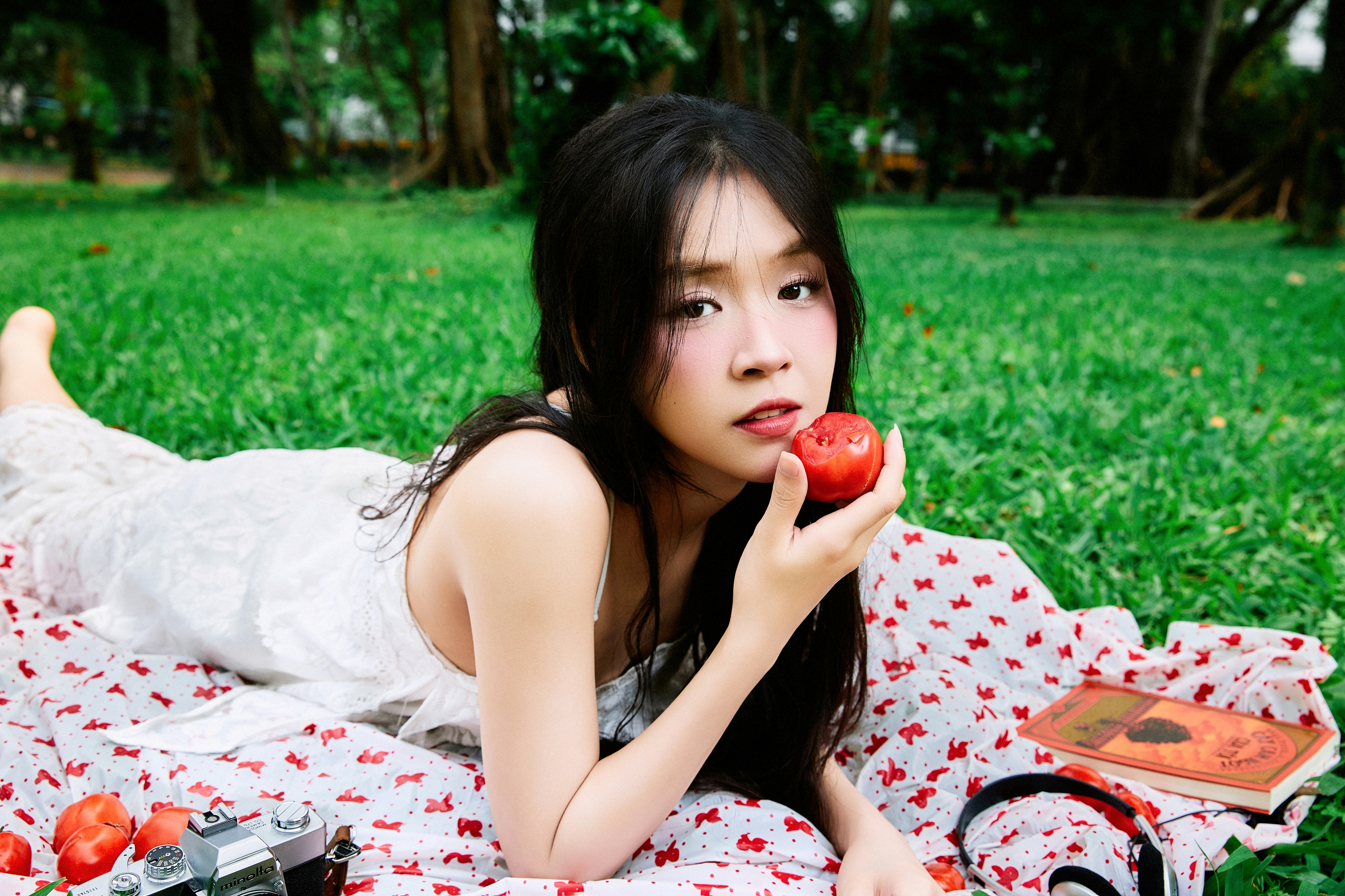 Cherry-Eyed Calm: A Sunlit Picnic Moment
