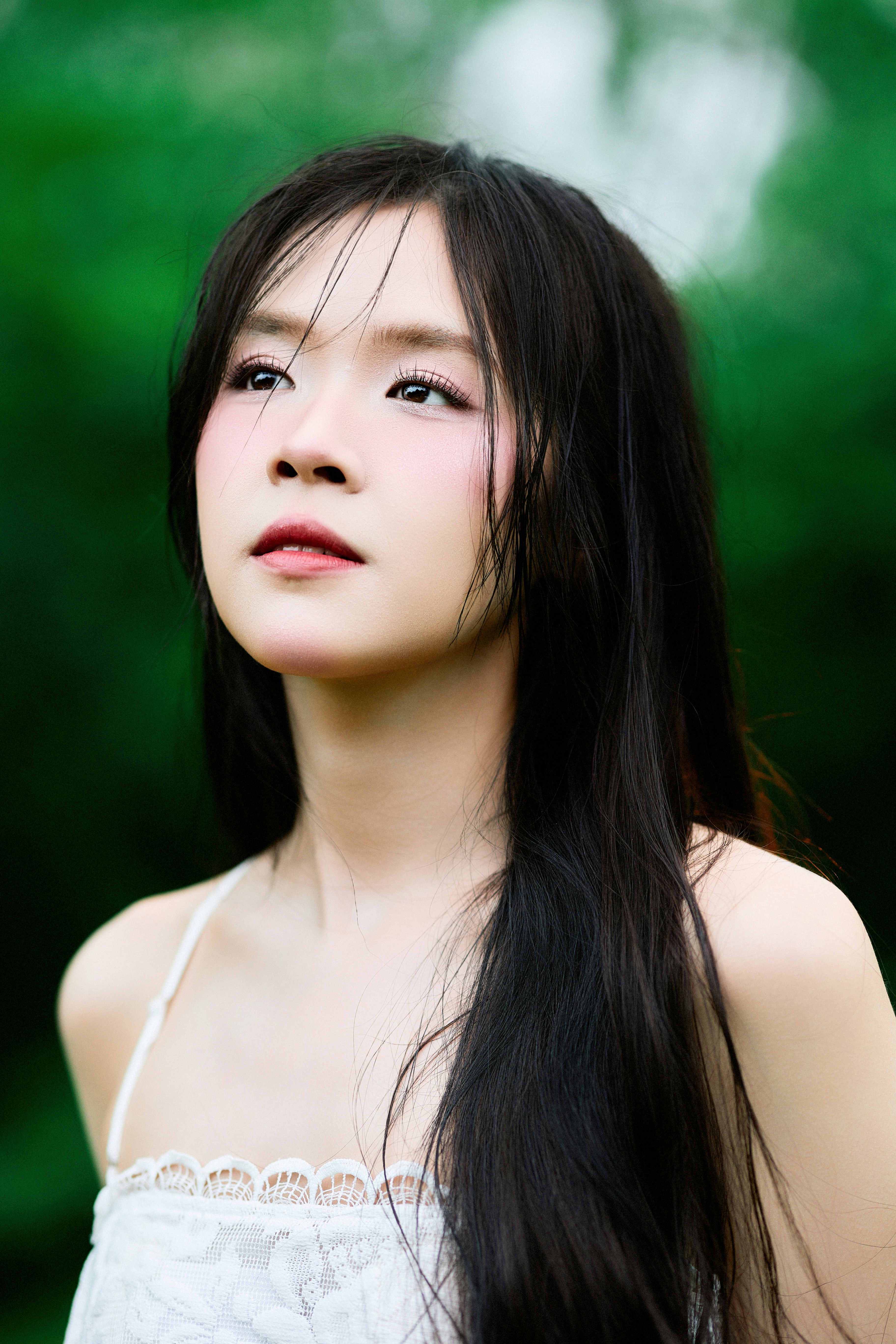 Soft Gaze Under Green Canopy