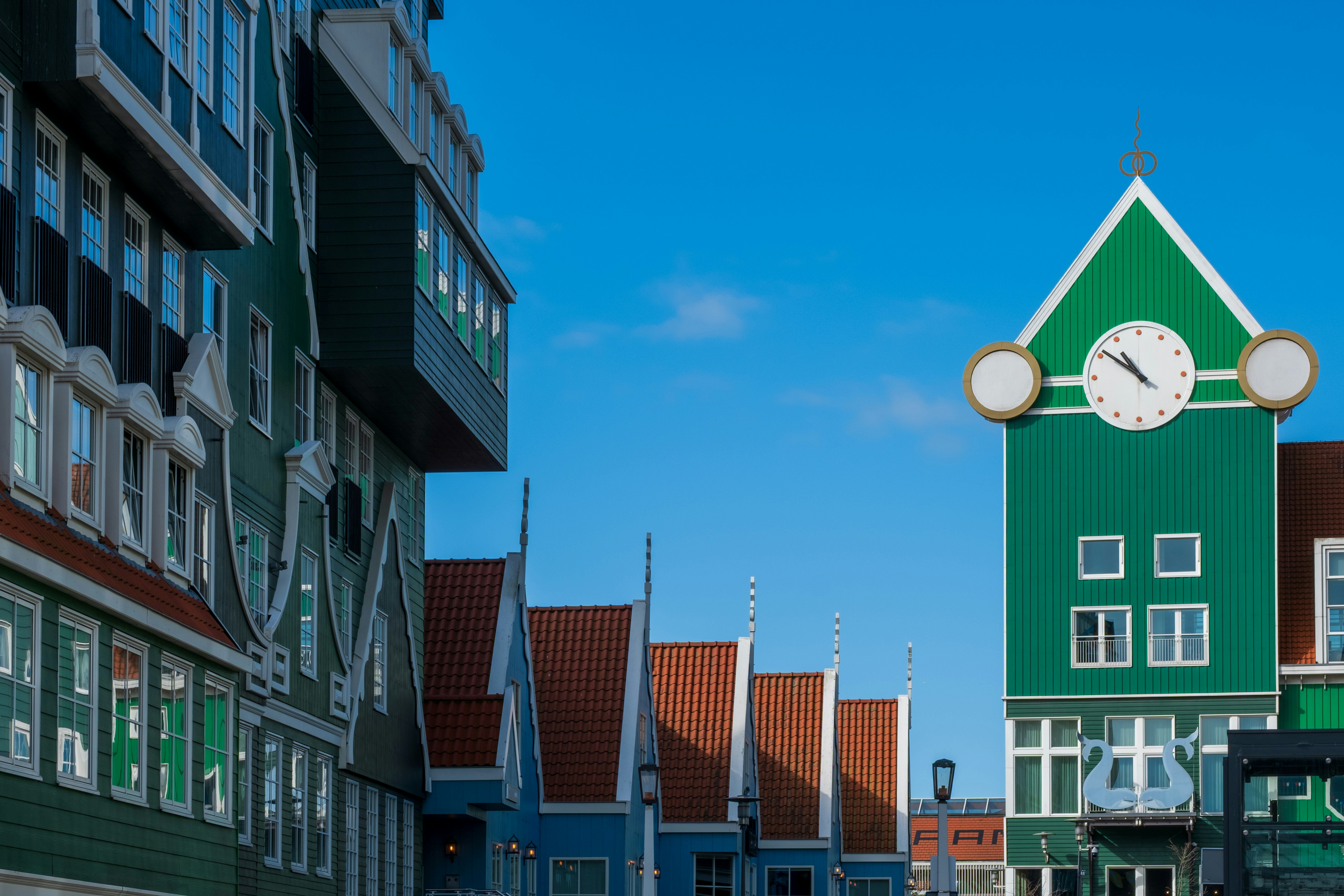 Clock Tower on a Row of Colorful Alpine-Inspired Townhouses