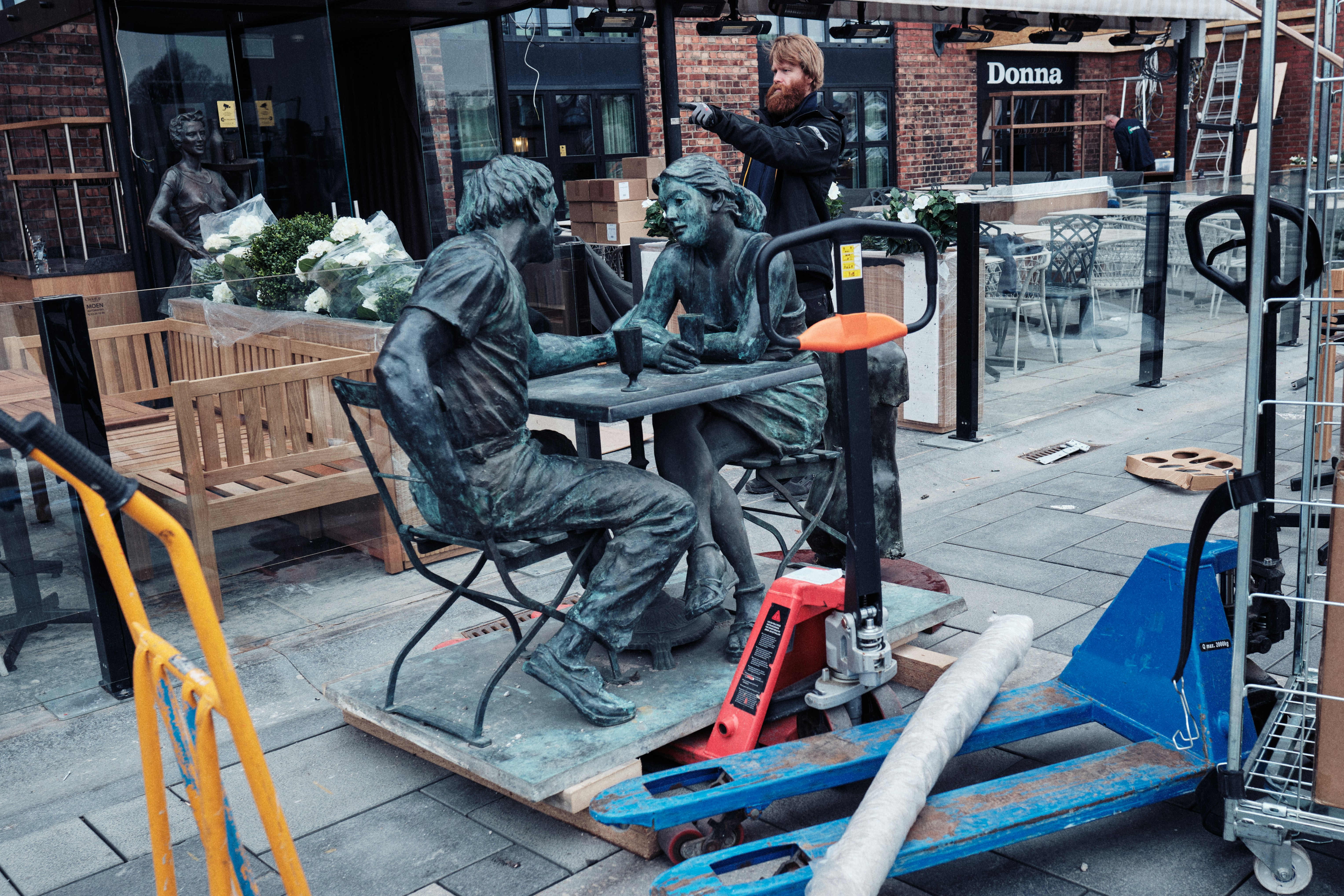 Bronze Table Talk on a Quiet City Street