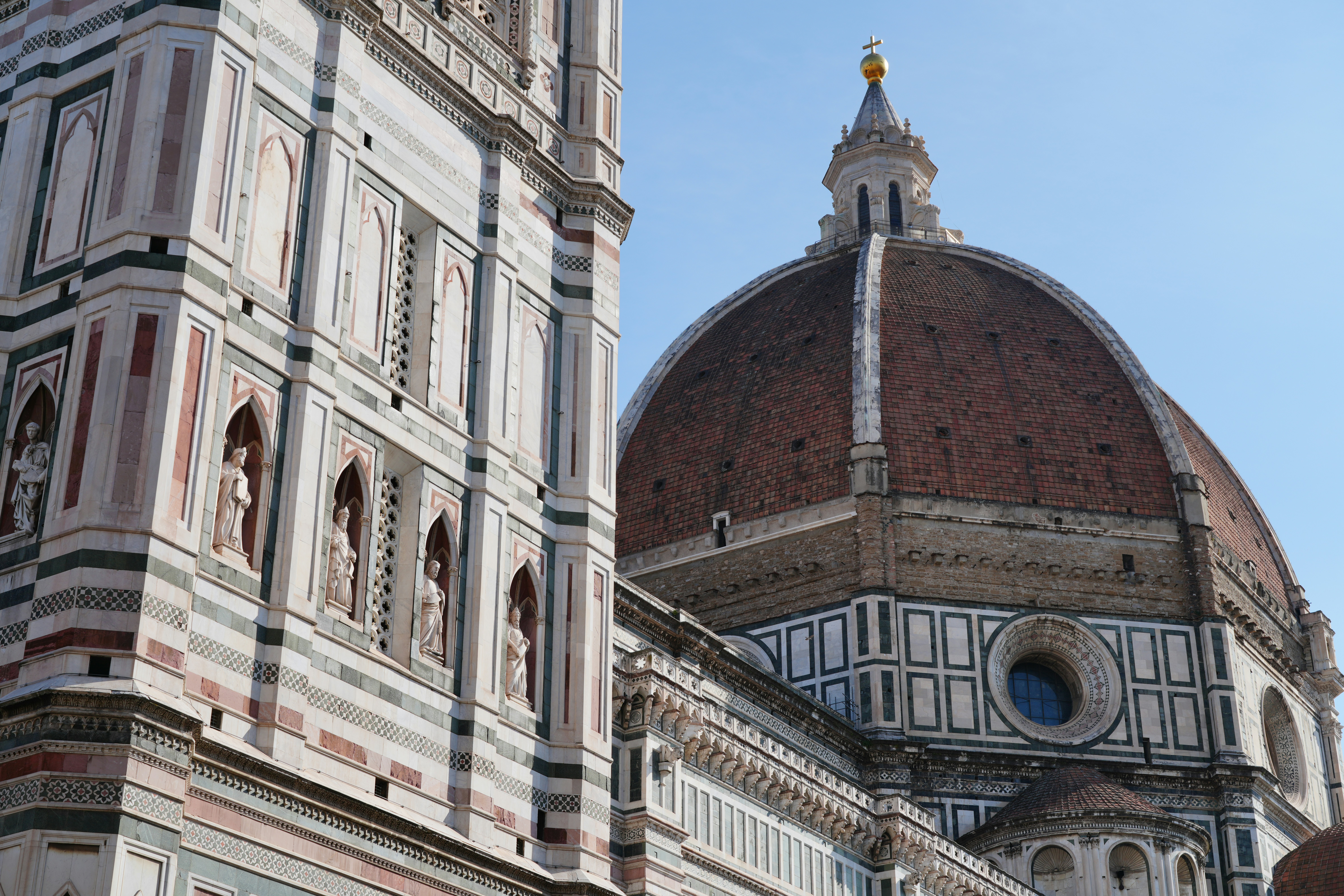 Dome and Marbled Facades: A Florentine Cathedral Corner