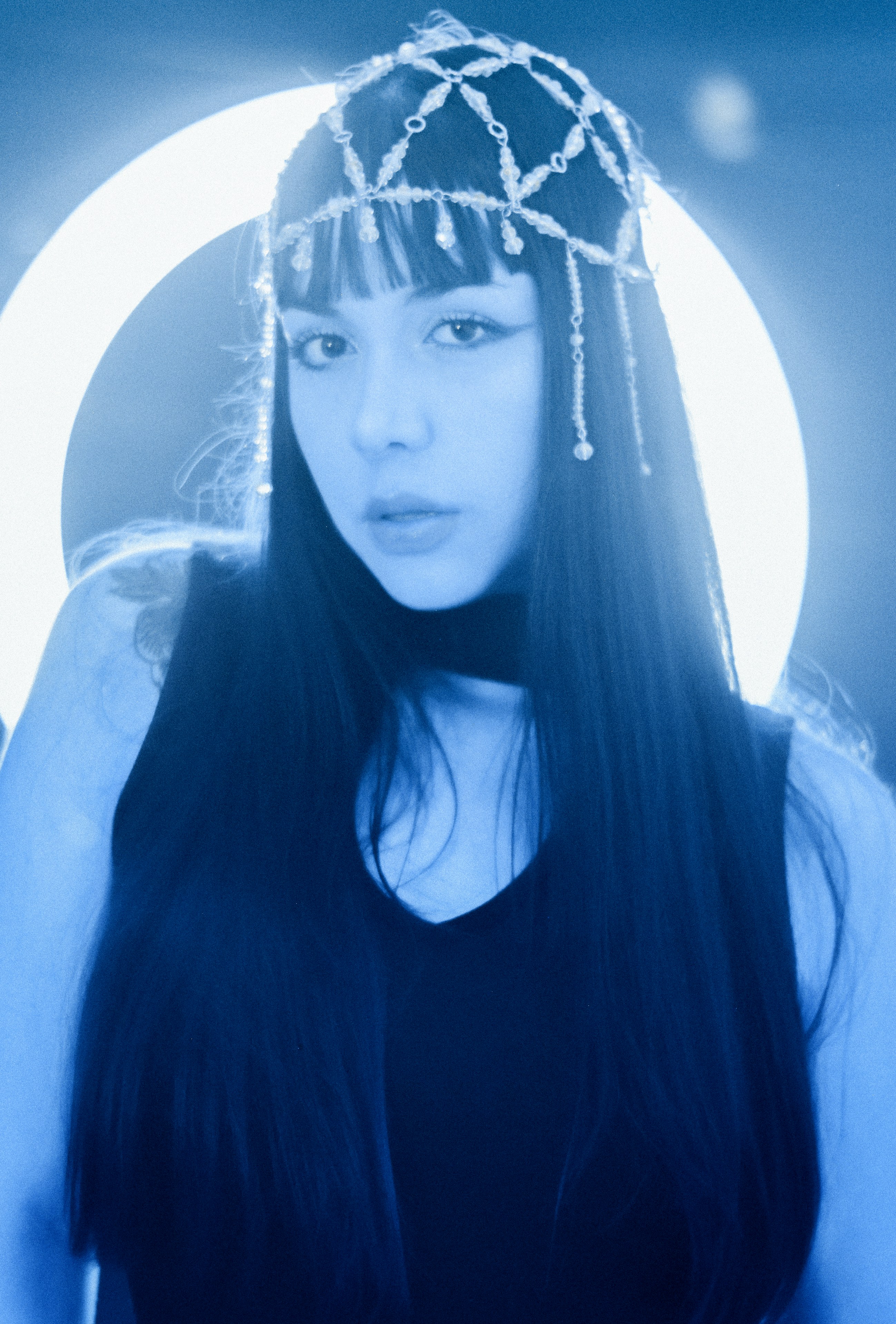 Halo of Light: A Portrait in Neon Blue