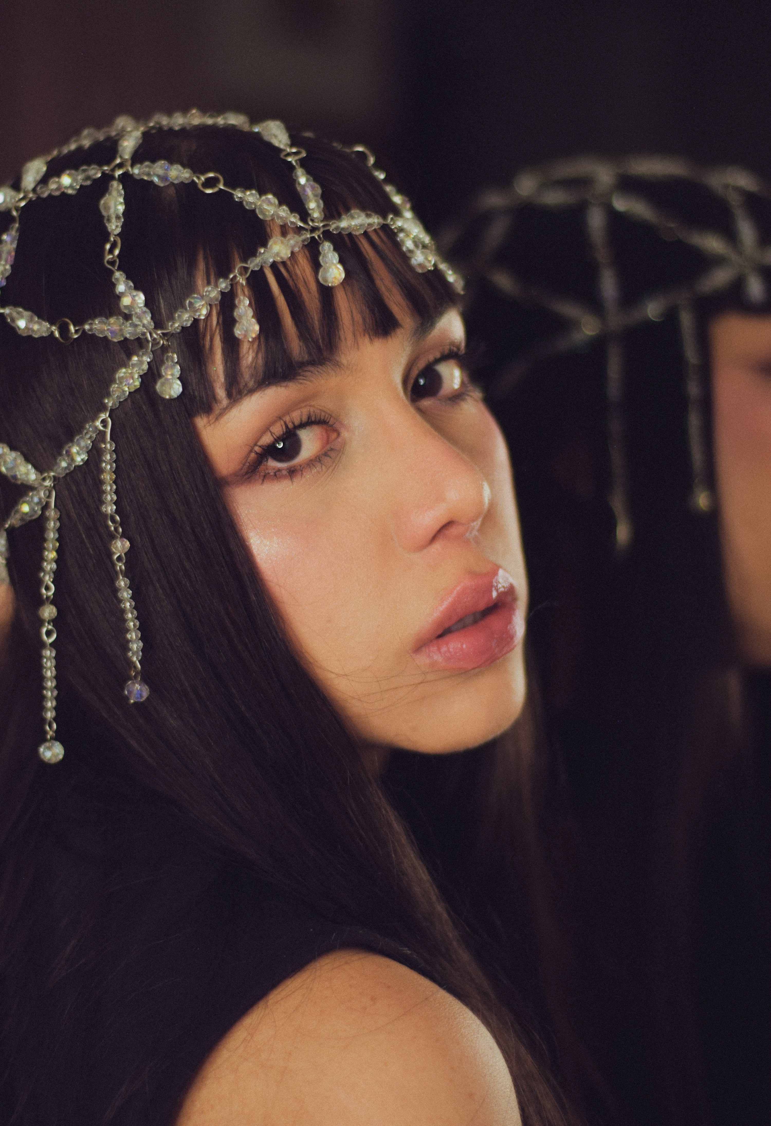 Glimmering Veil: A Portrait of Quiet Intensity