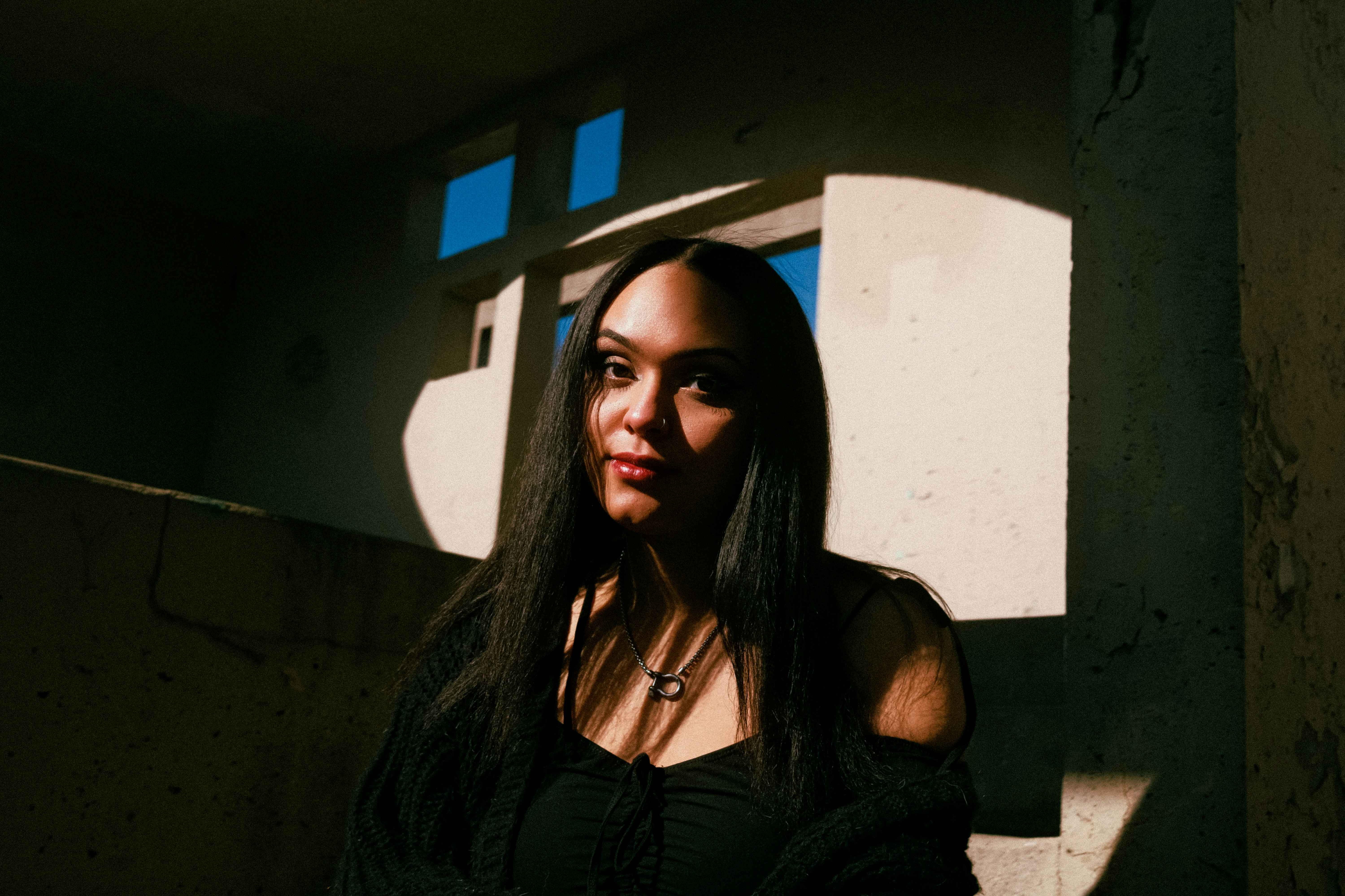 Soft-light Portrait in a Sunlit Concrete Space