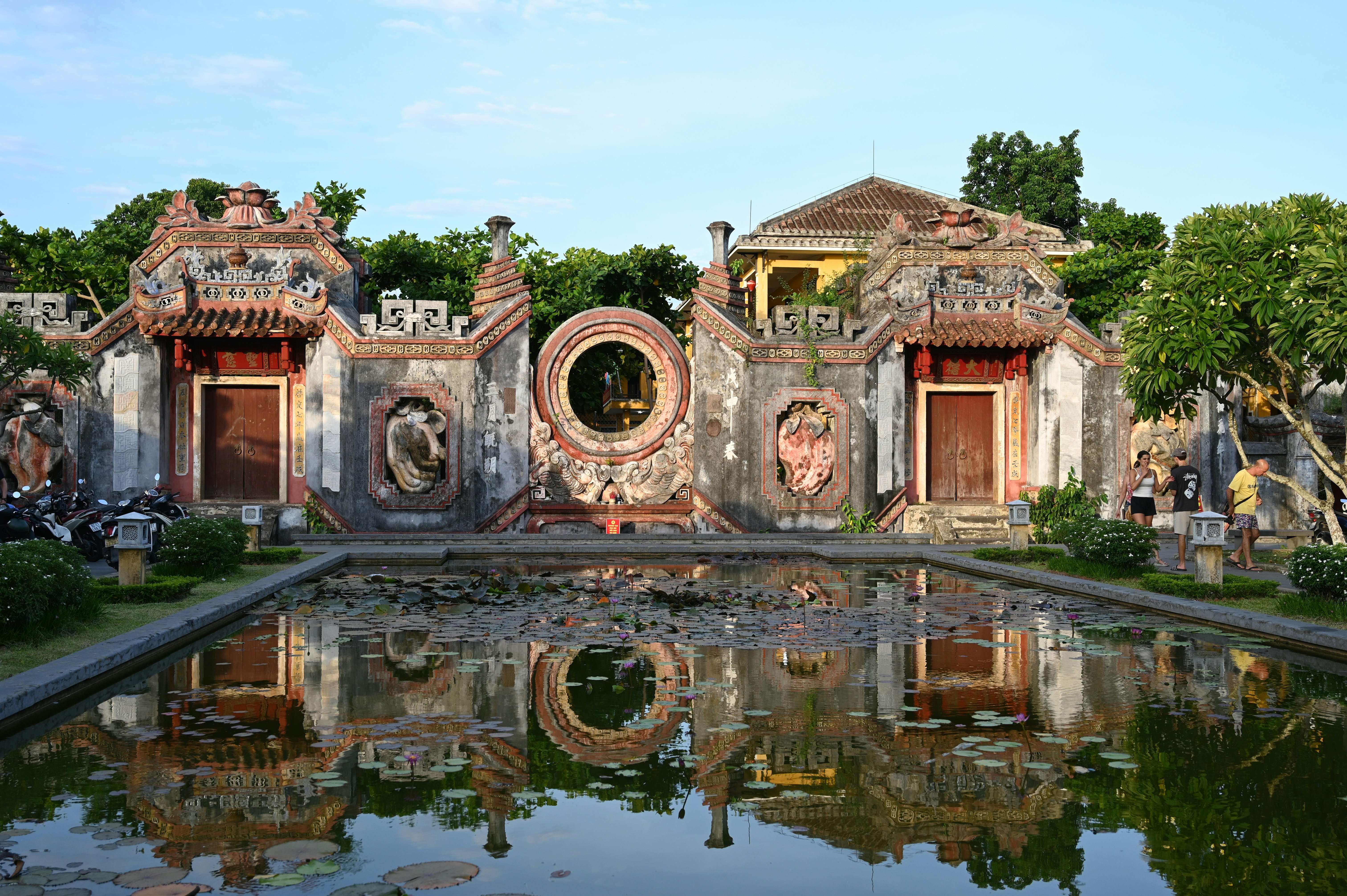 Reflected Gatehouse Symphony Across an Garden Pool