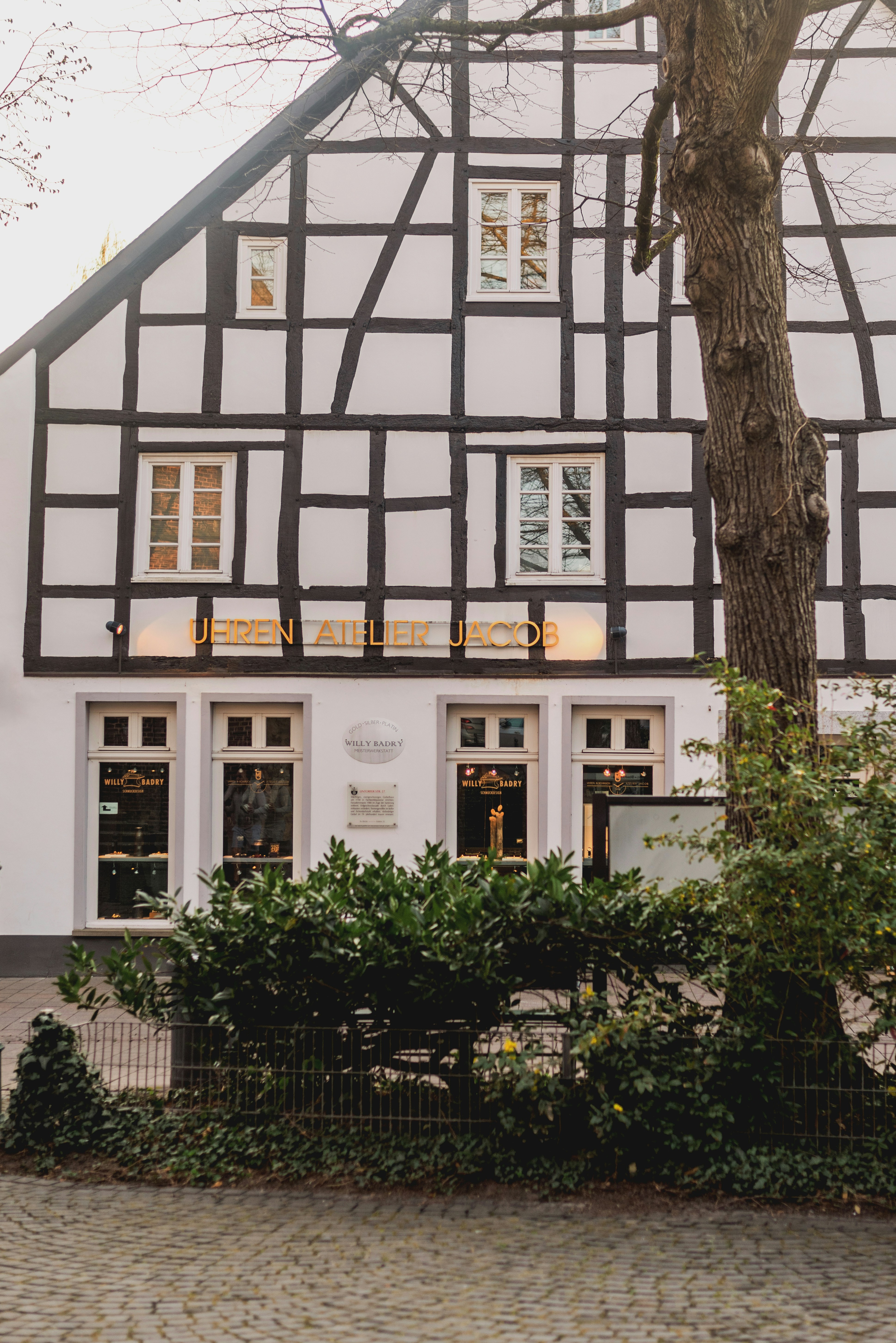 Timber-and-Taupe Facade: A German Fachwerk Shopfront