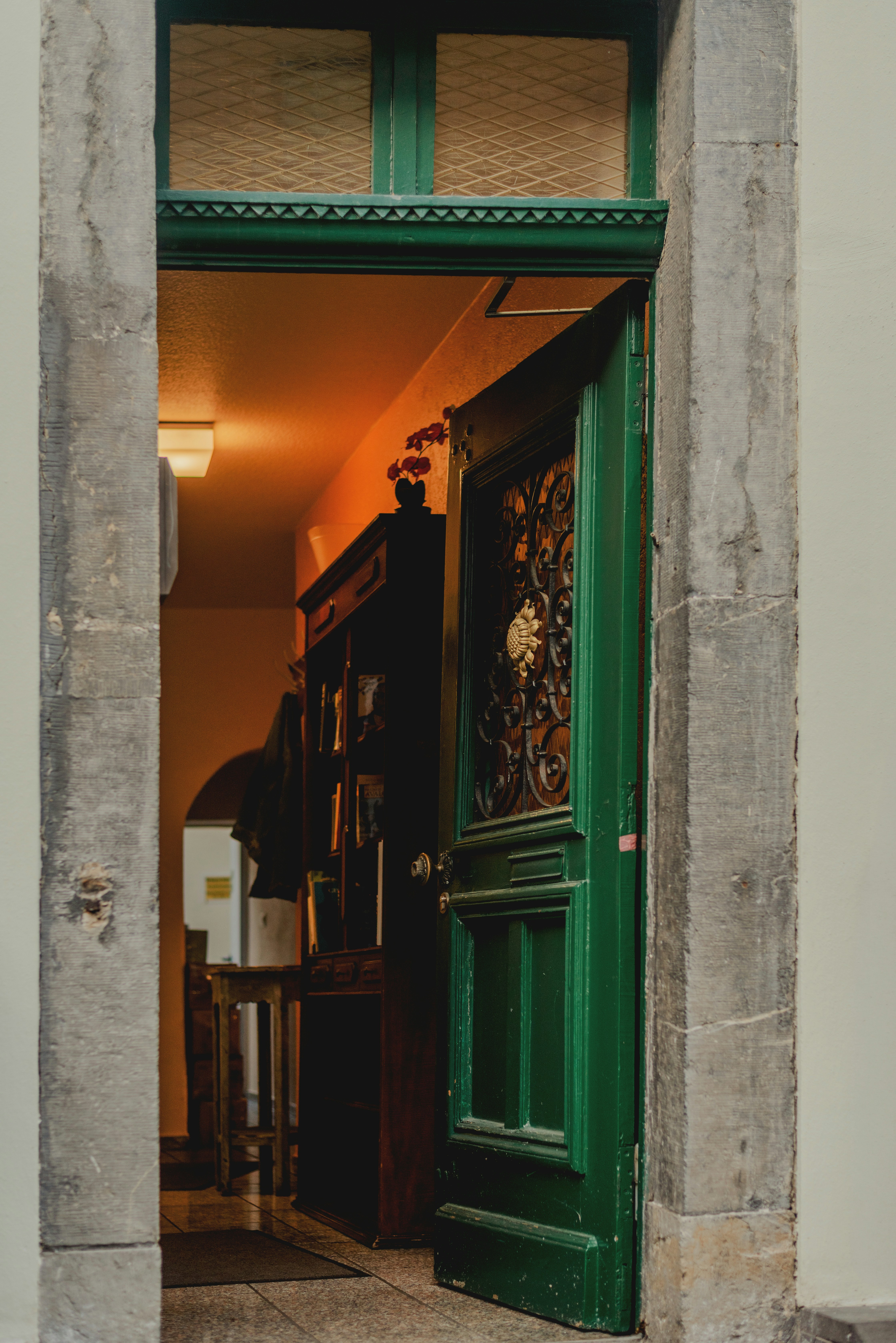Green Doorway into Warm Interior