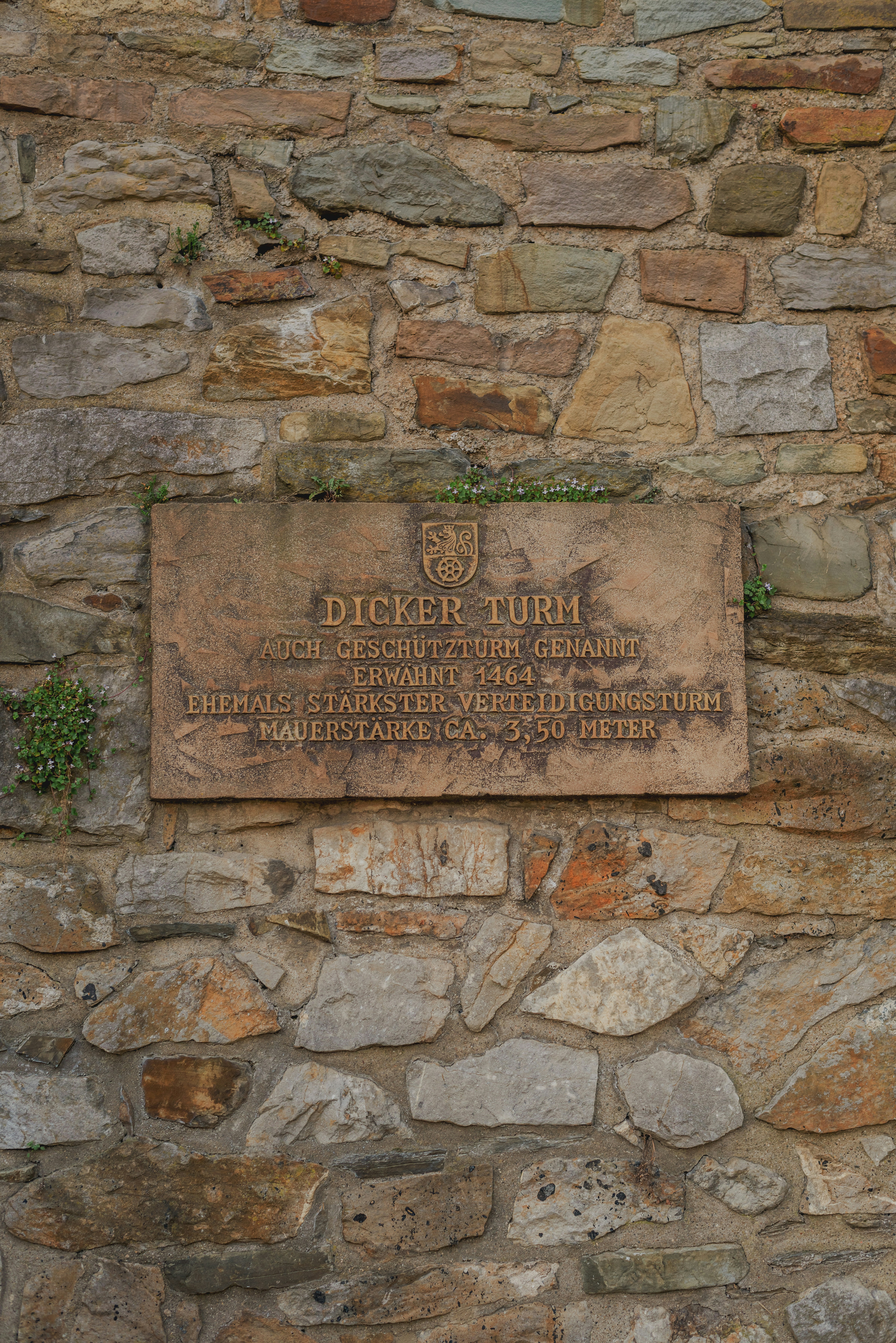 Stone Plaque on a Weathered Wall: Dicker Turm Inscription