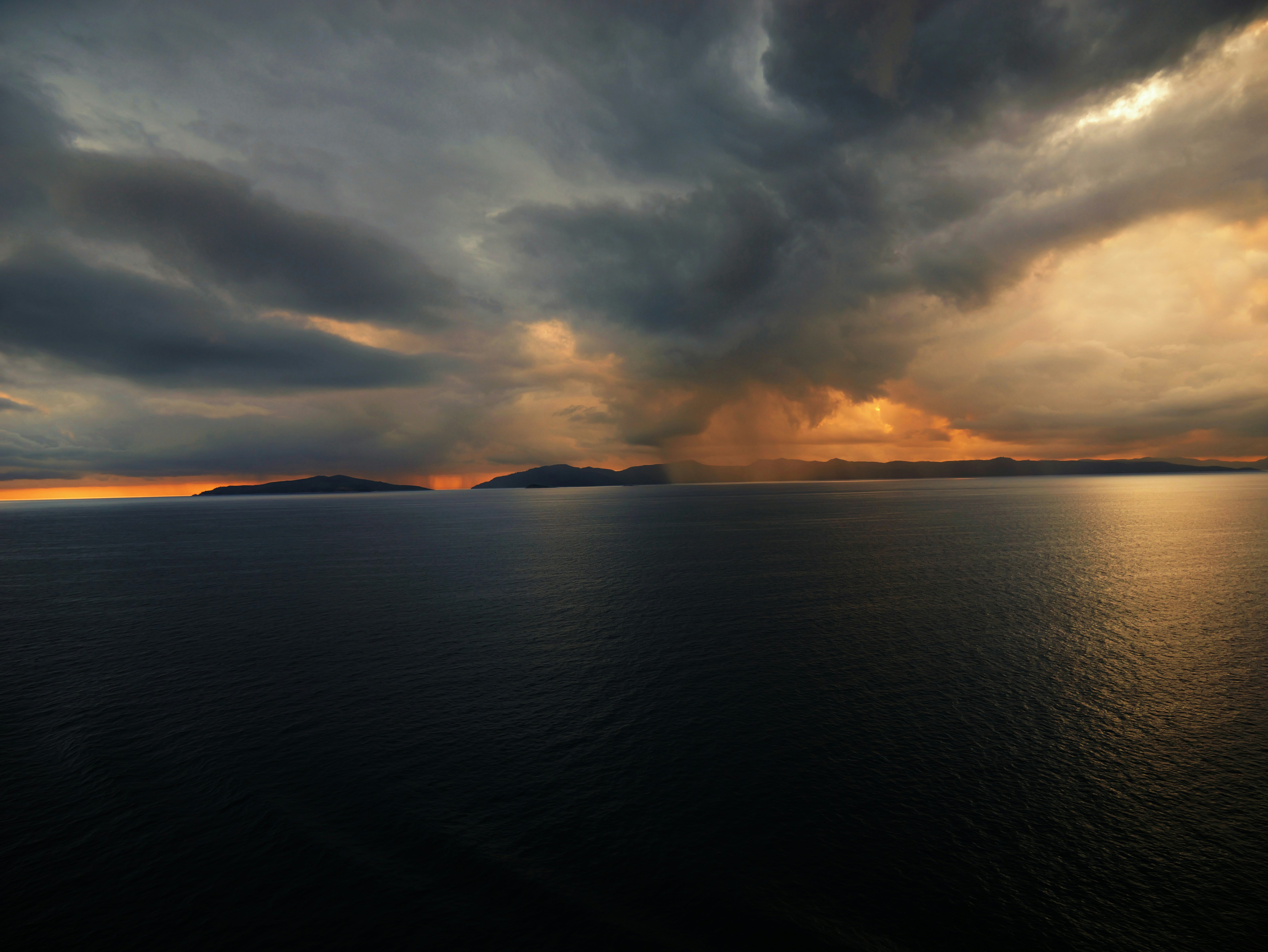 Horizon of Quiet Storms at Sunset