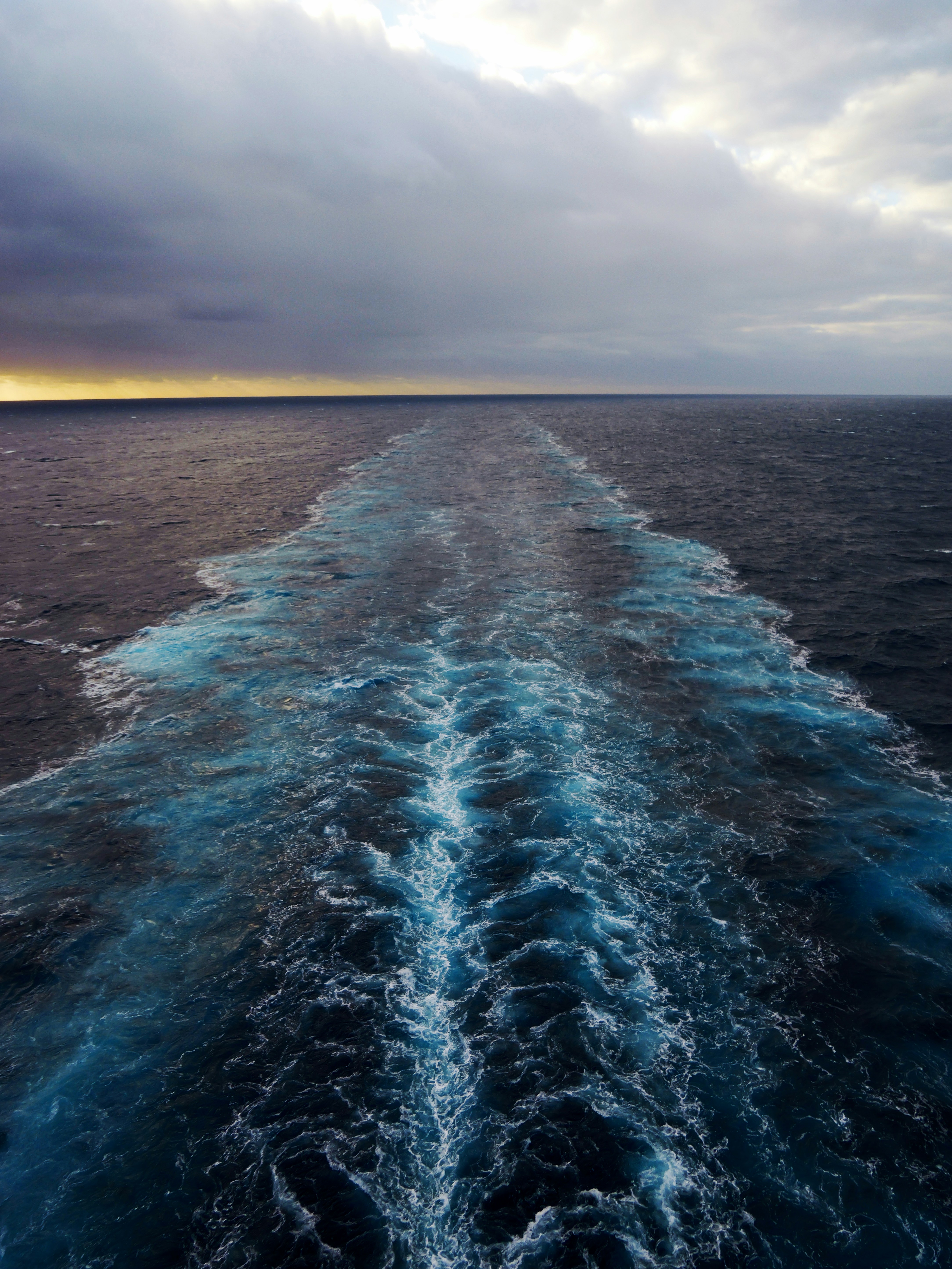 Toward the Horizon: A Ship's Wake Carving the Atlantic