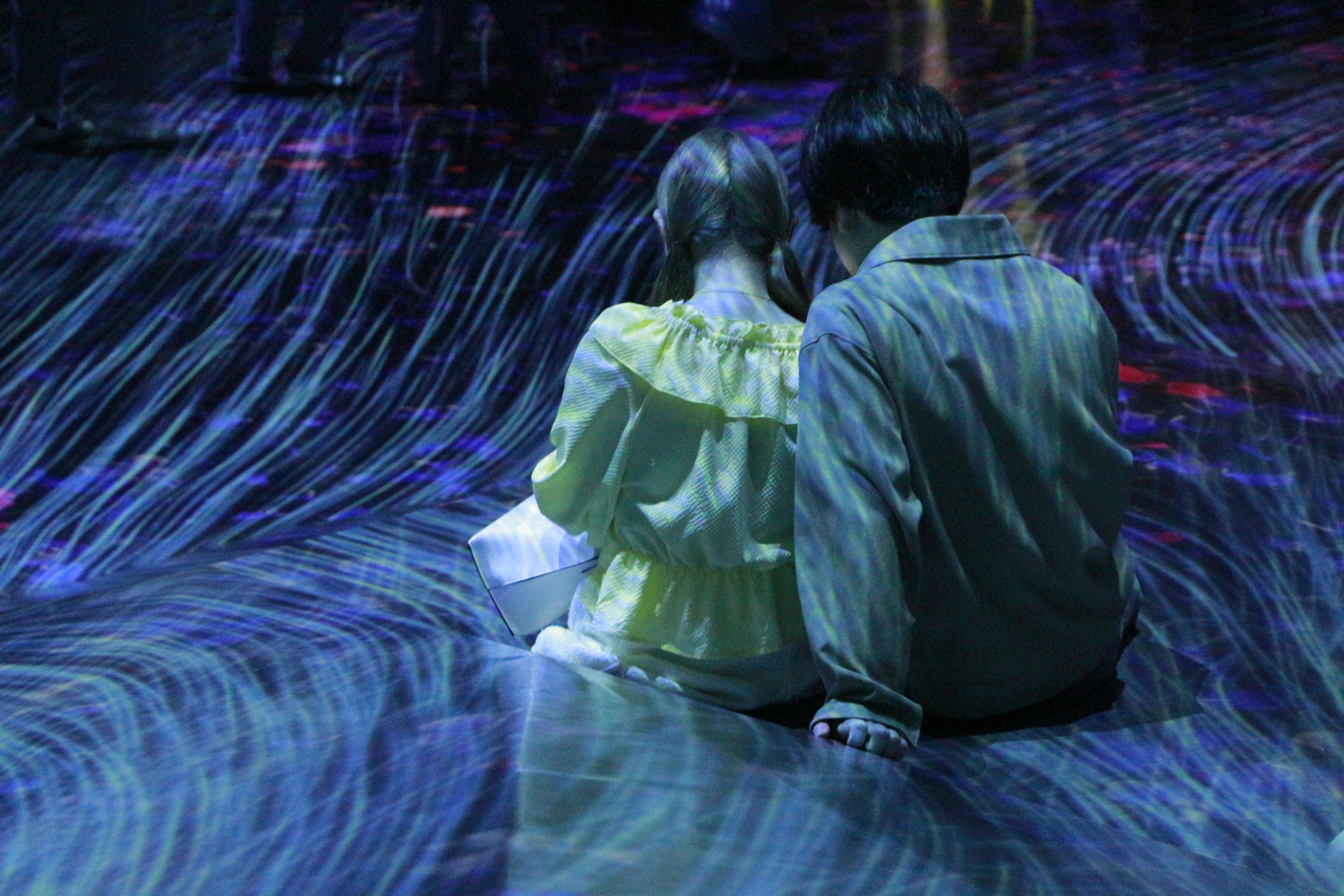 Whispering Lights: A Quiet Moment Beneath a Dreamlike Corridor