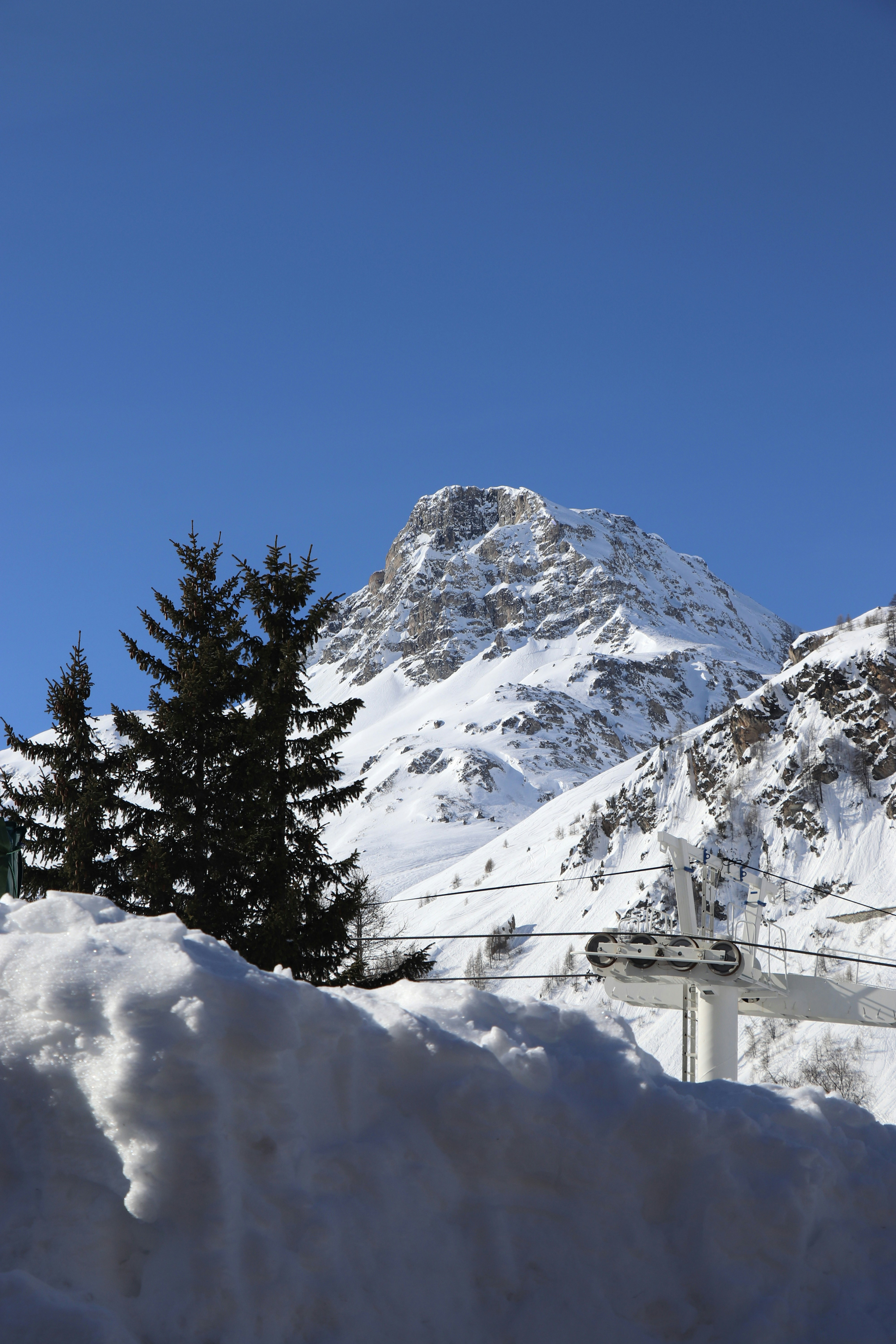 Snowbound Summit under a Clear Blue Sky