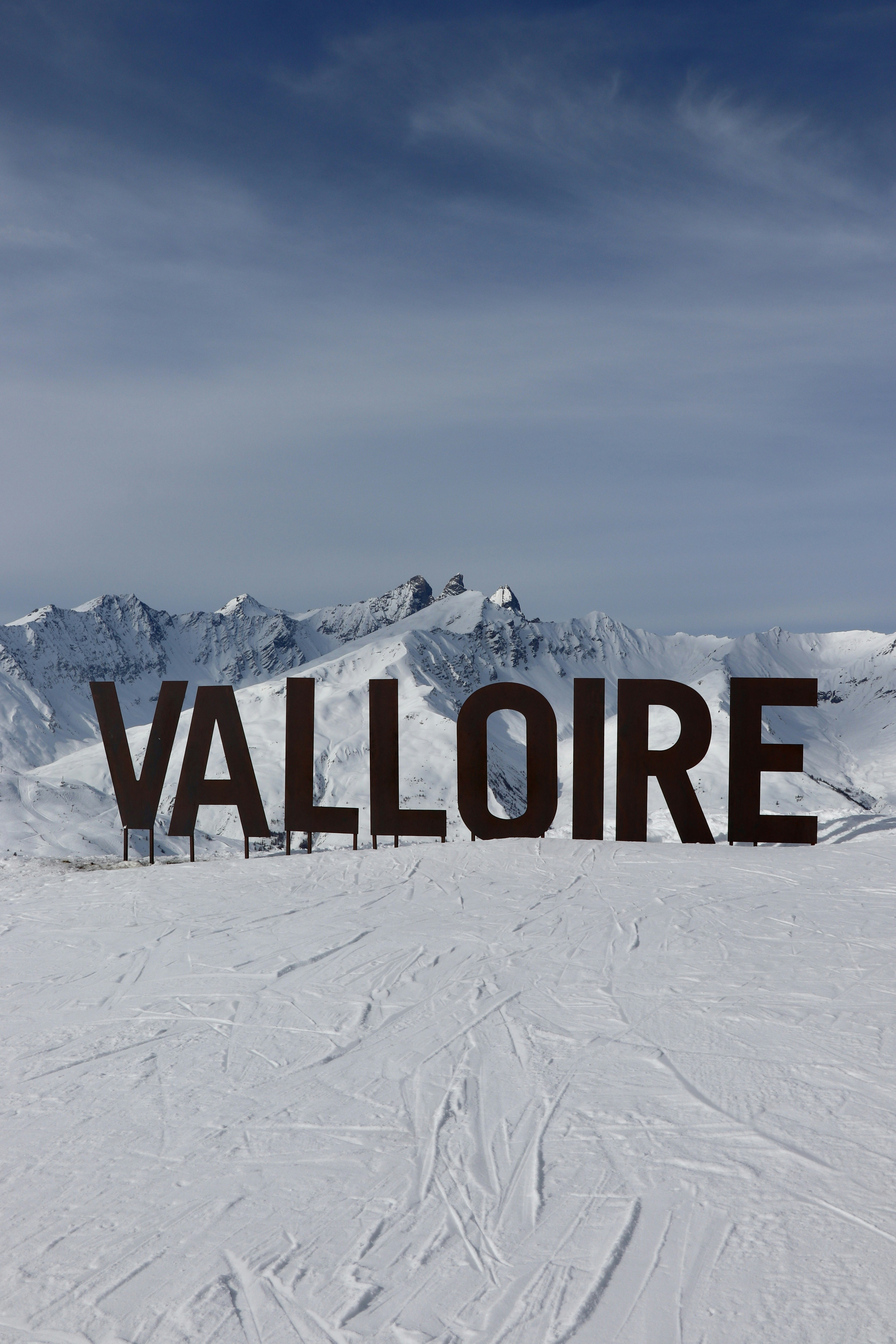 Valloire Snow Sign: Mountain Crest and Powdered Foreground