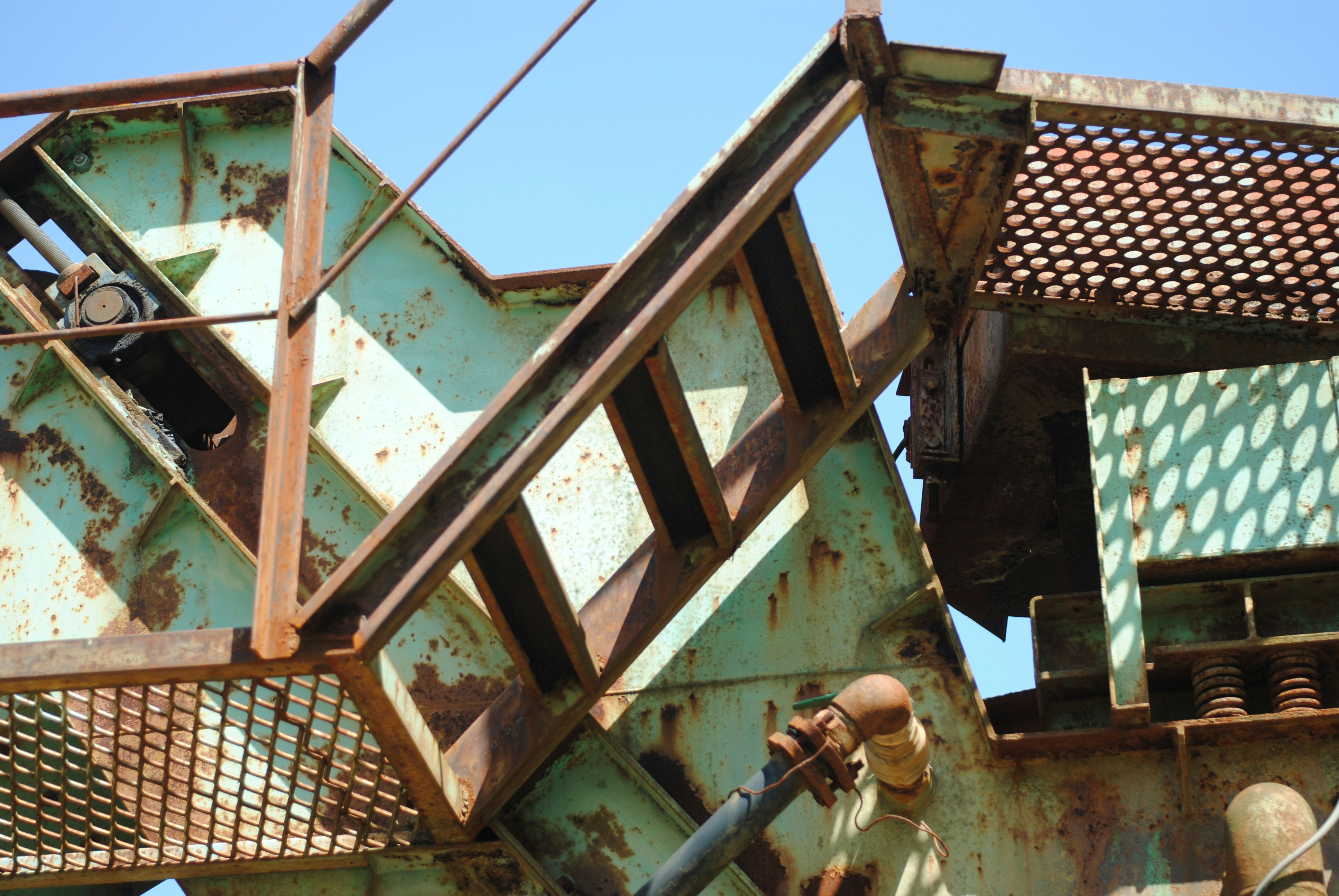 Rusted Machinery Lattice: Intersections of Steel and Sky