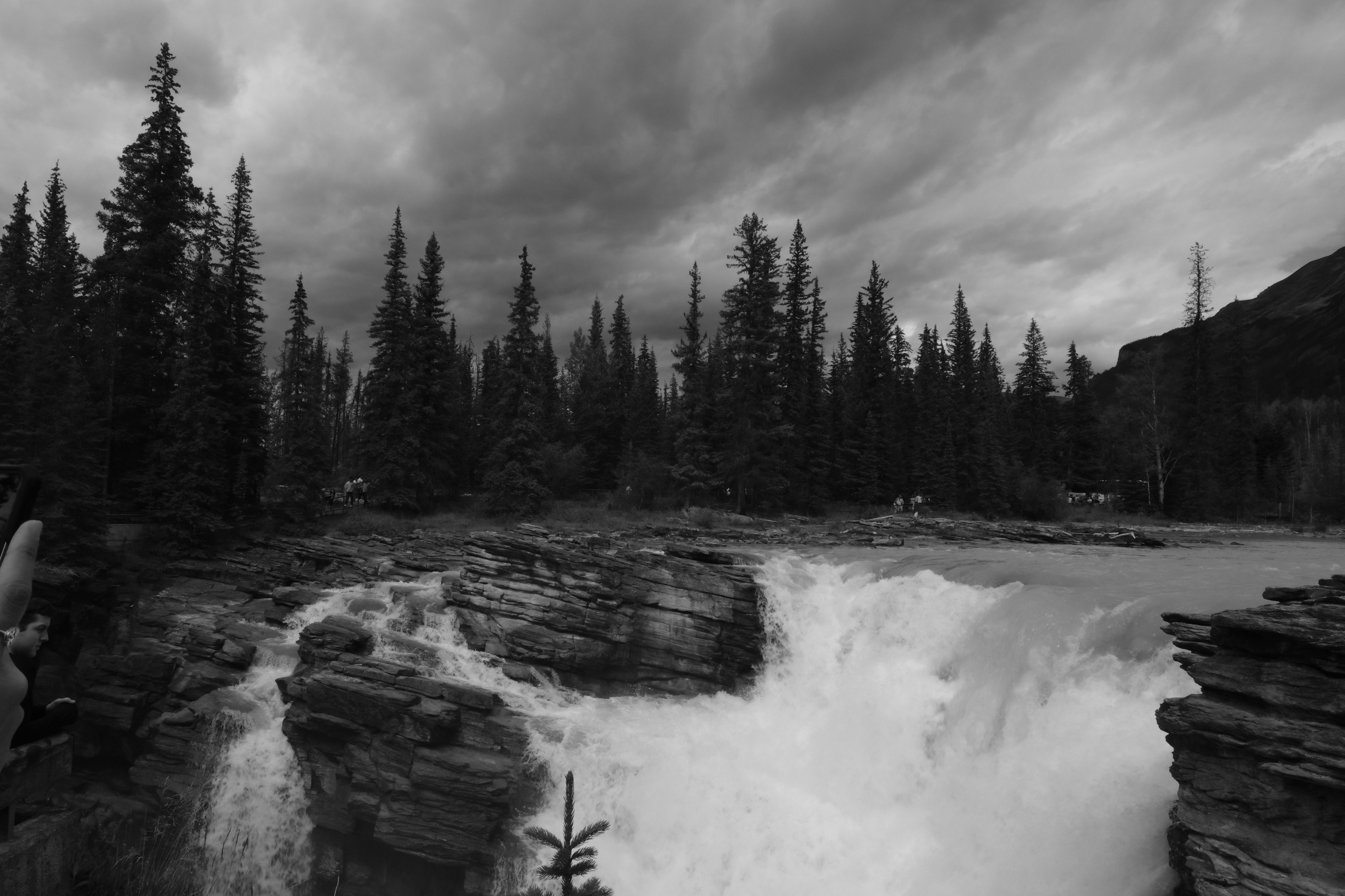 Rushing Canyon: Water Collides with Weathered Ridges