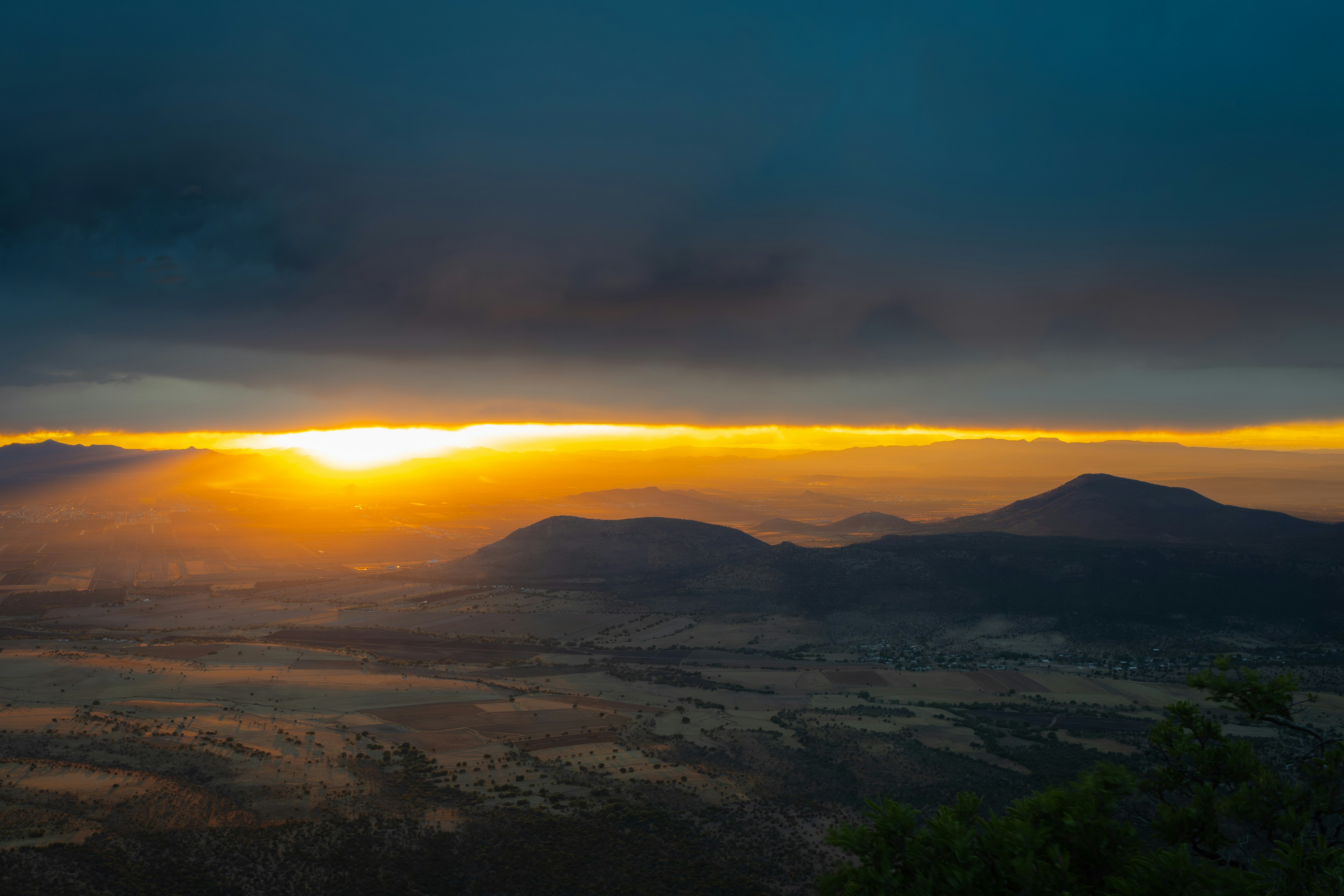 Dawn over the Valleys: Sun Breaks the Horizon