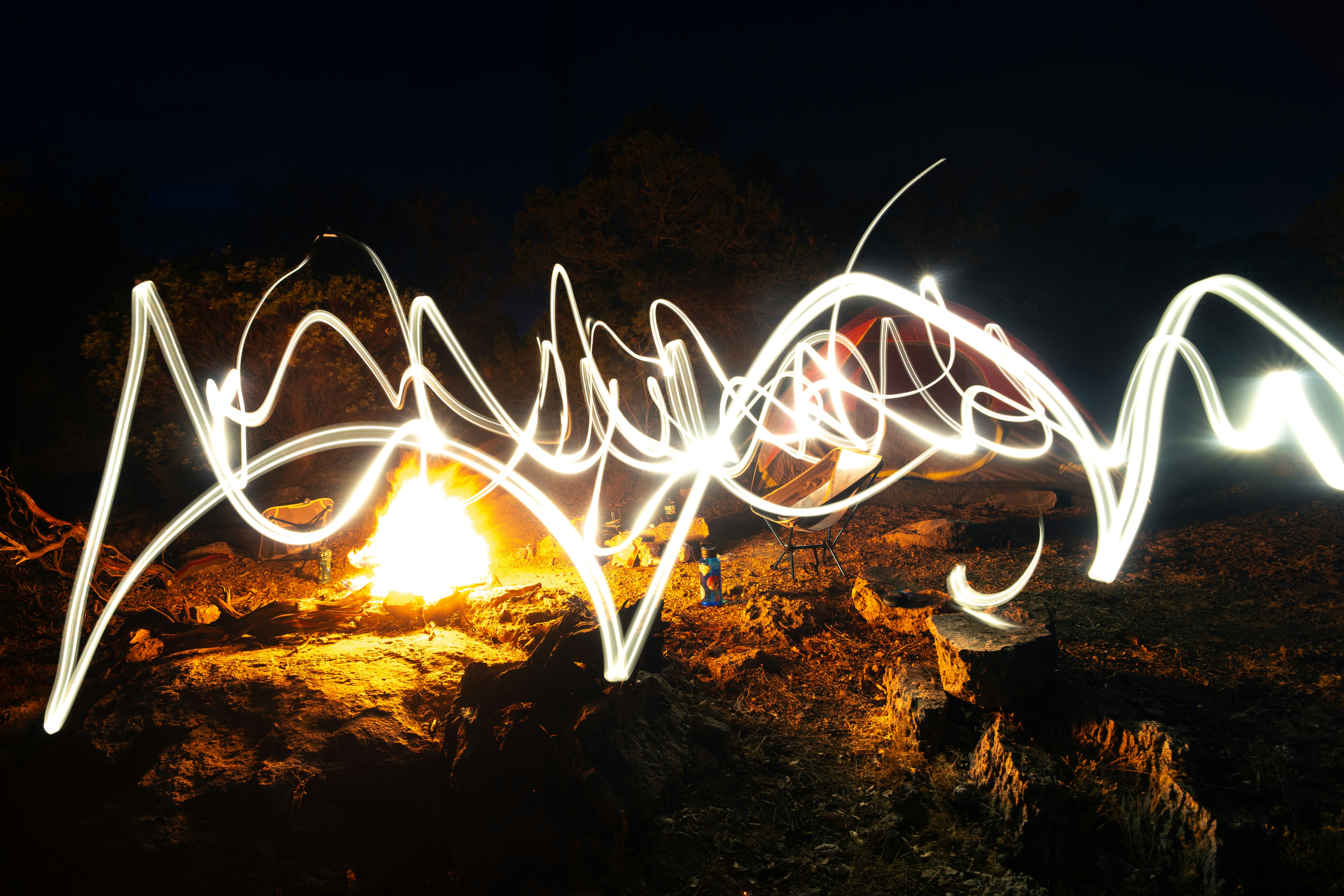 Trail of Light: Night-Scape with Light-Painting Over Granite Ruins