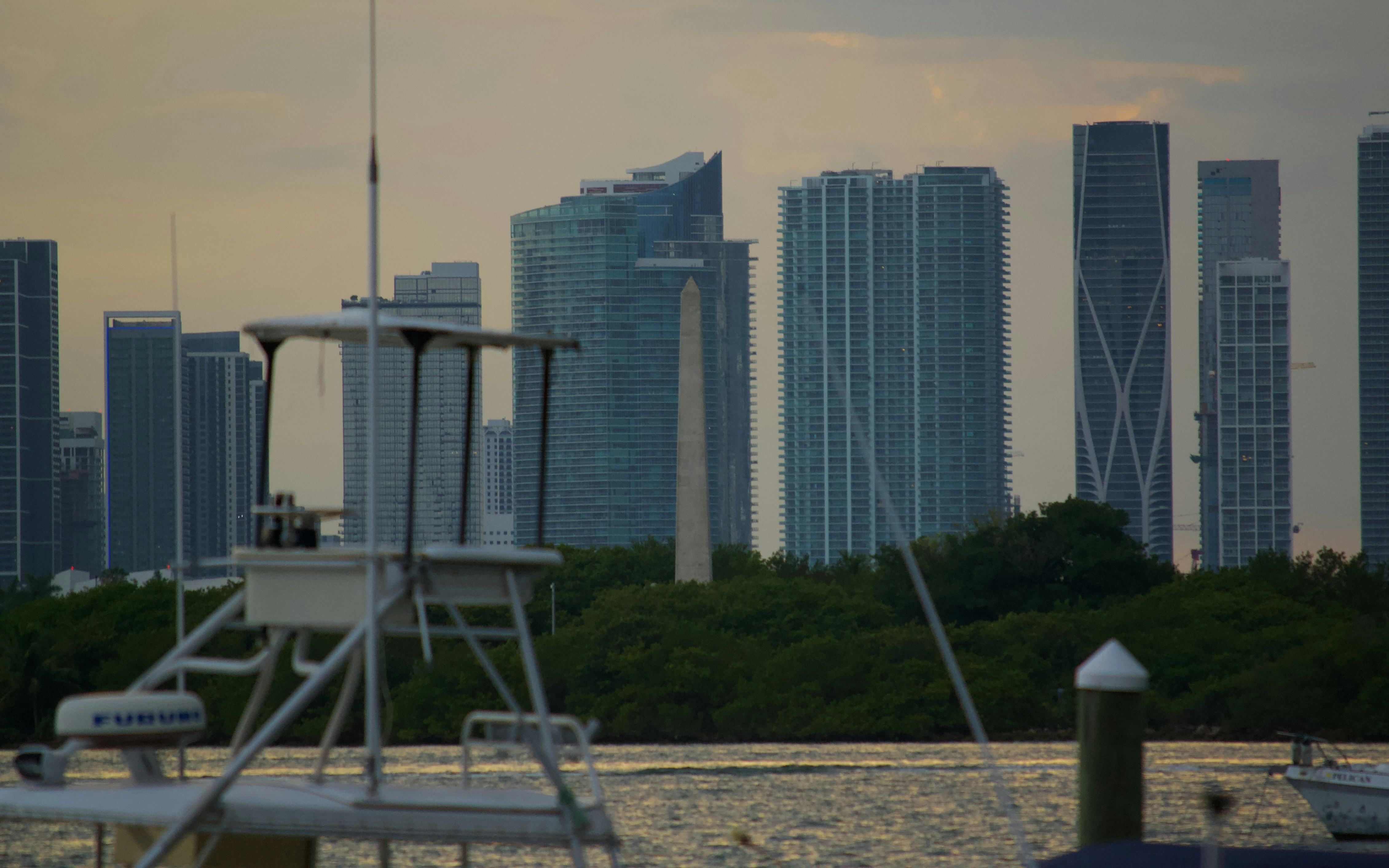 Harbor Edges: City Skyscrapers Framed by Dockside Foreground