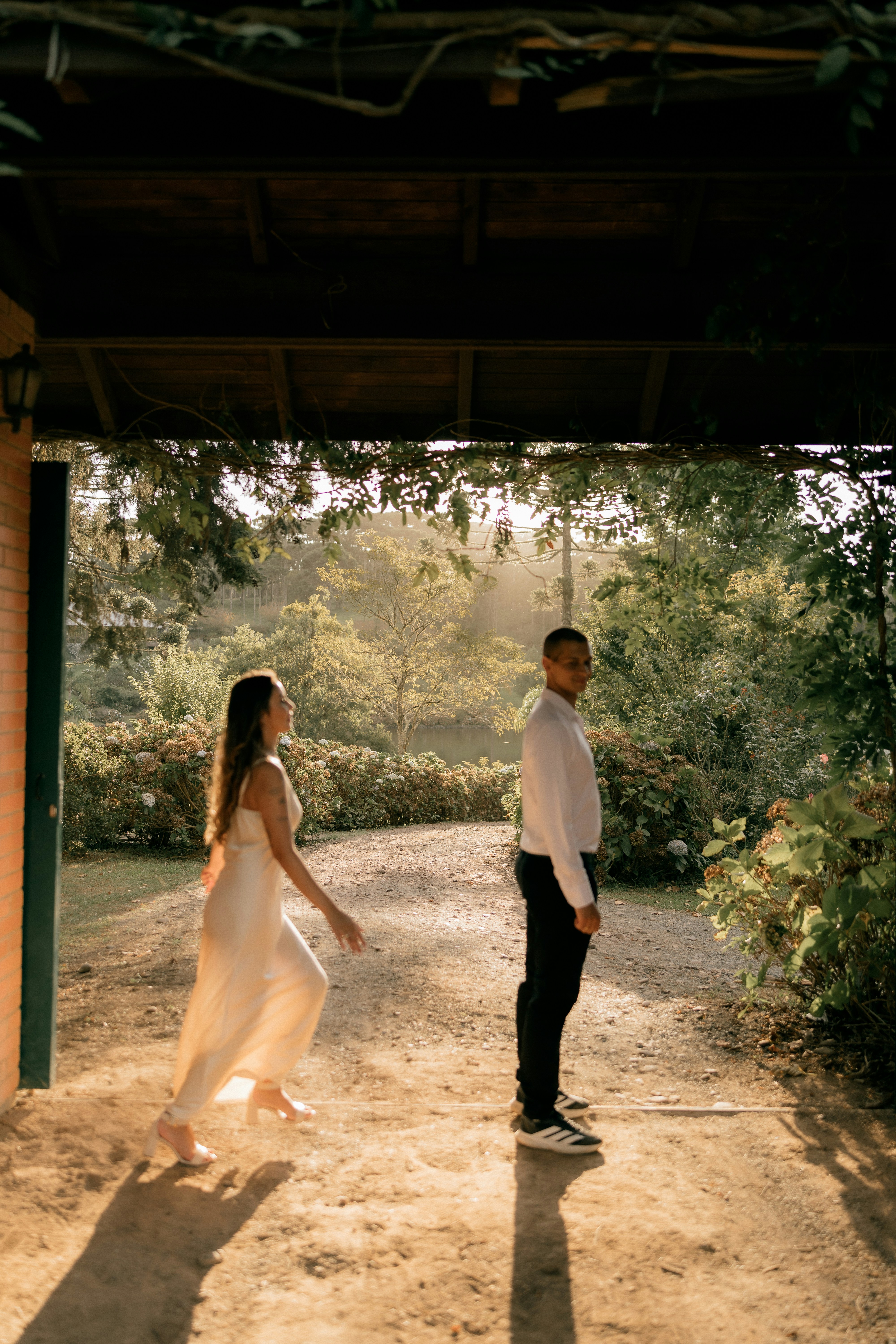 Sunlit Exit: A Quiet Moment Under the Garden Arch
