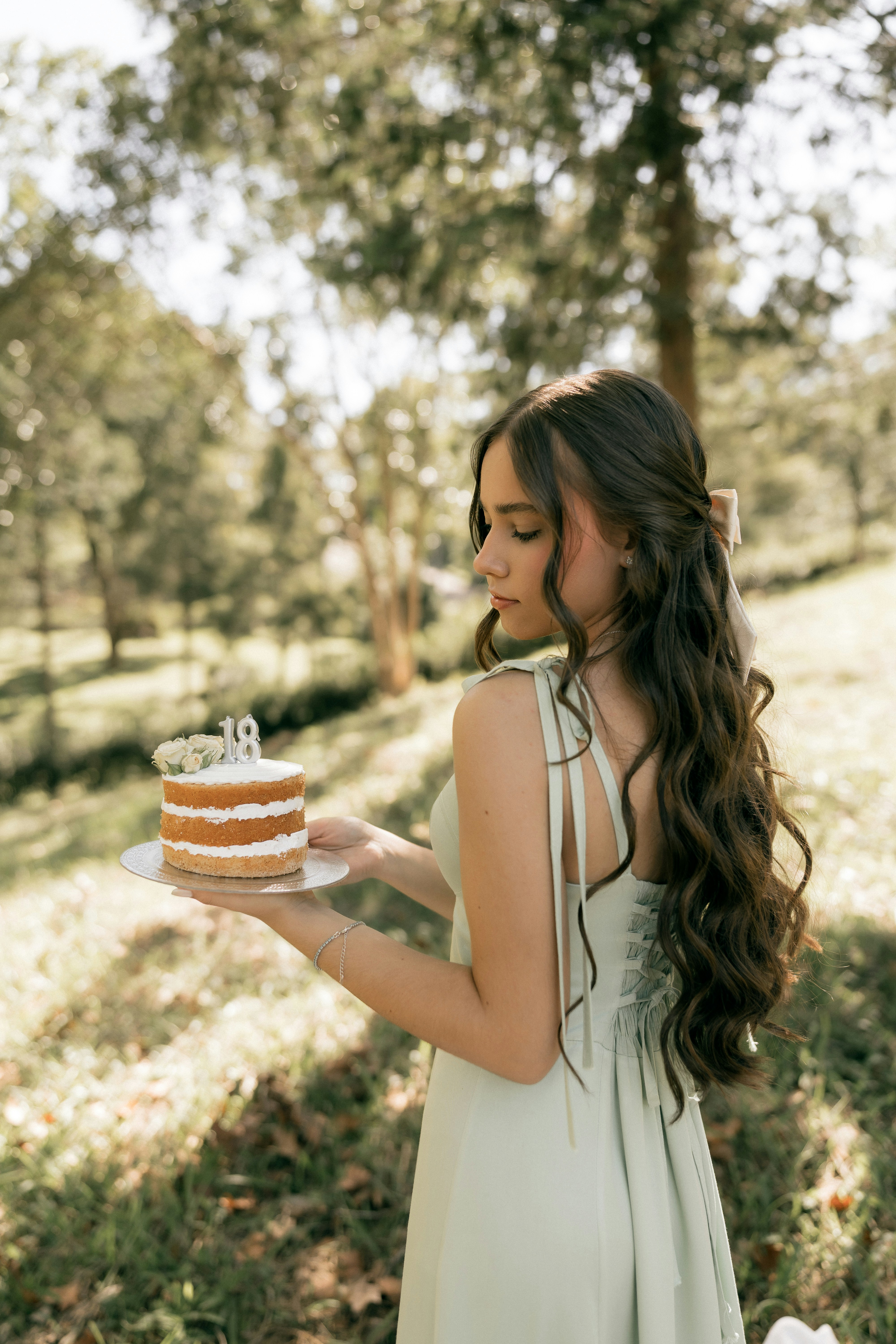 Soft Dawn Birthday: A Gracious Bride-to-Be with Cake in the Park