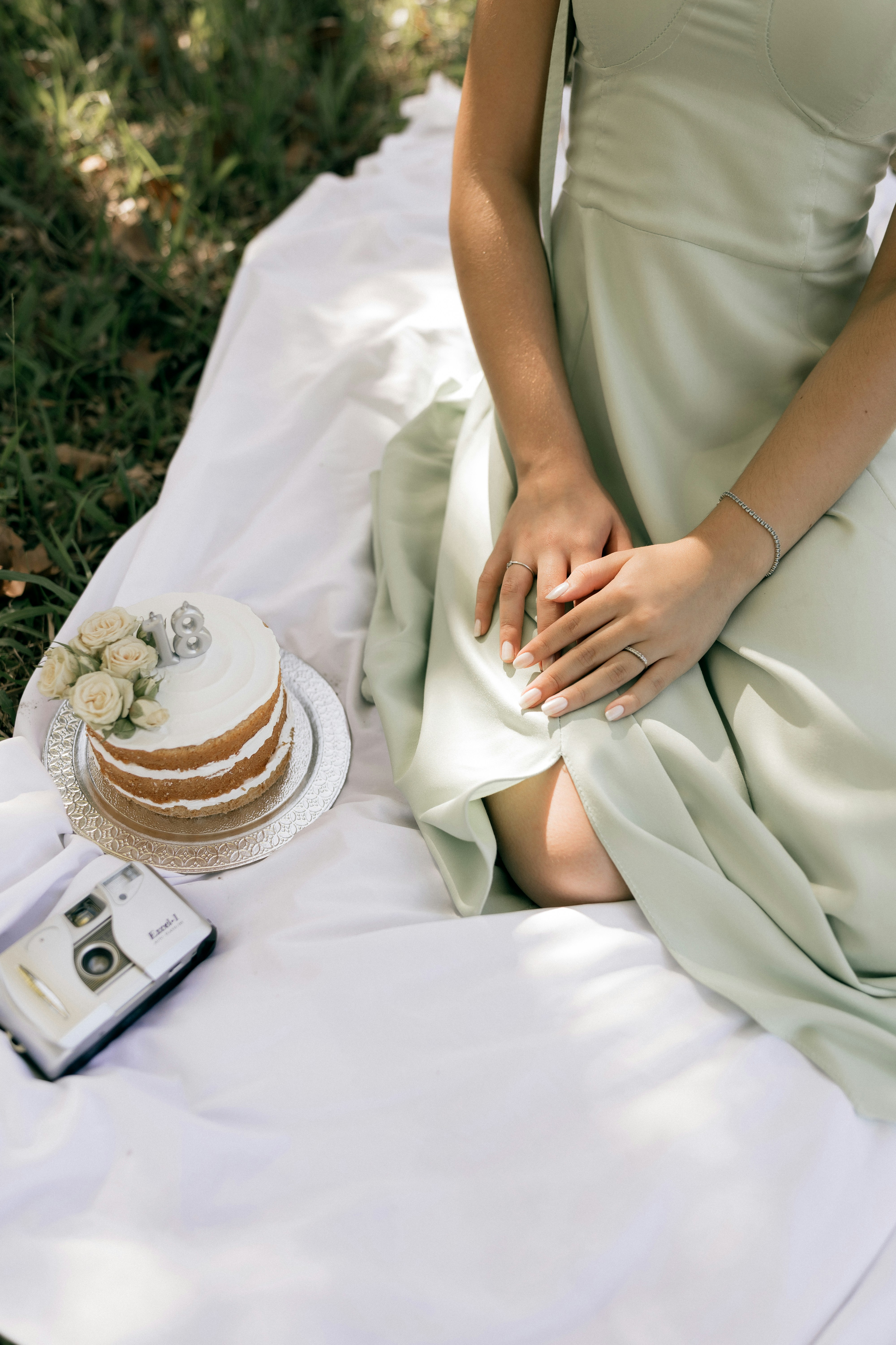 Pastel dress, cake, and a quiet moment in the garden