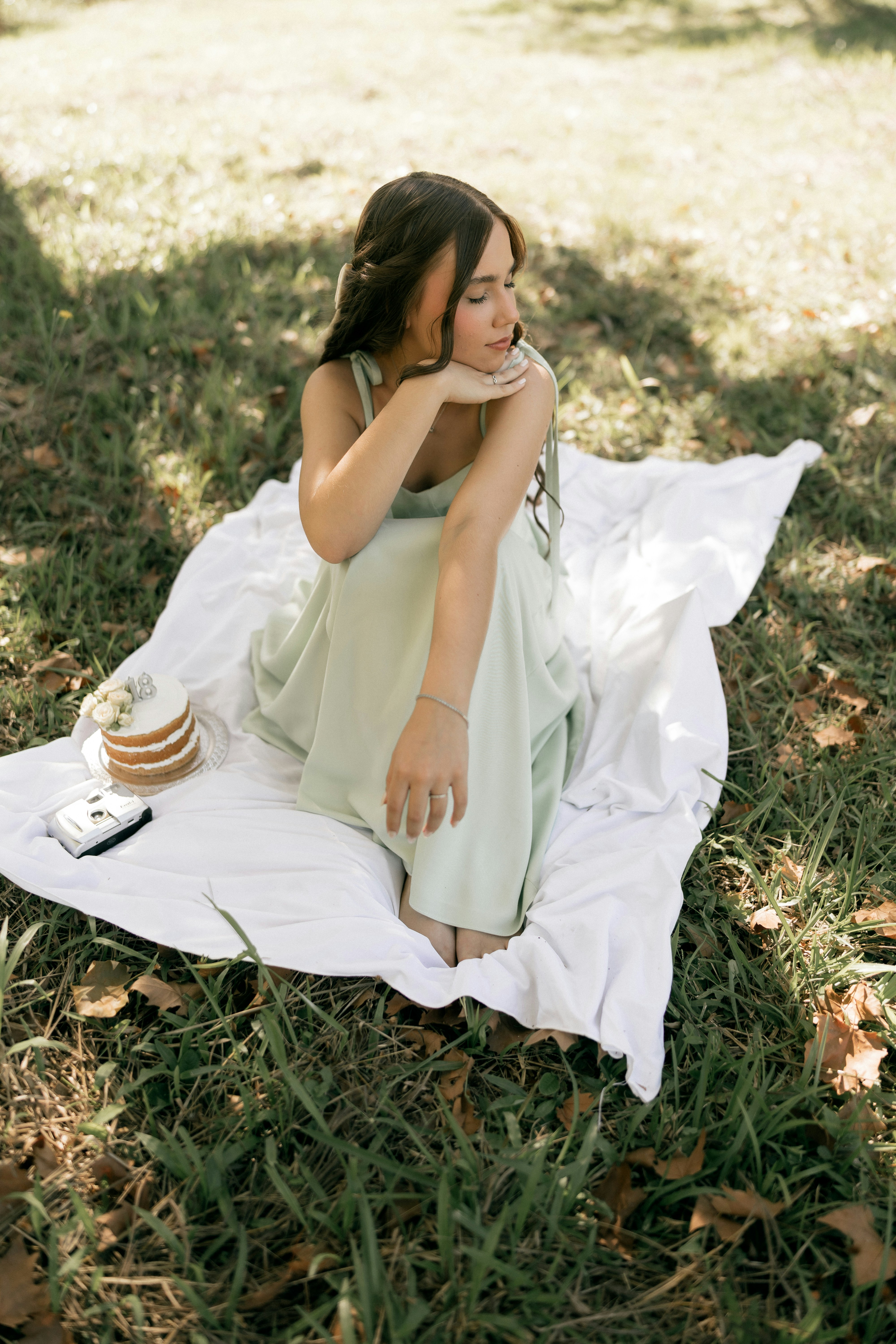 Serene Picnic Portrait: A moment of quiet beneath the leaves