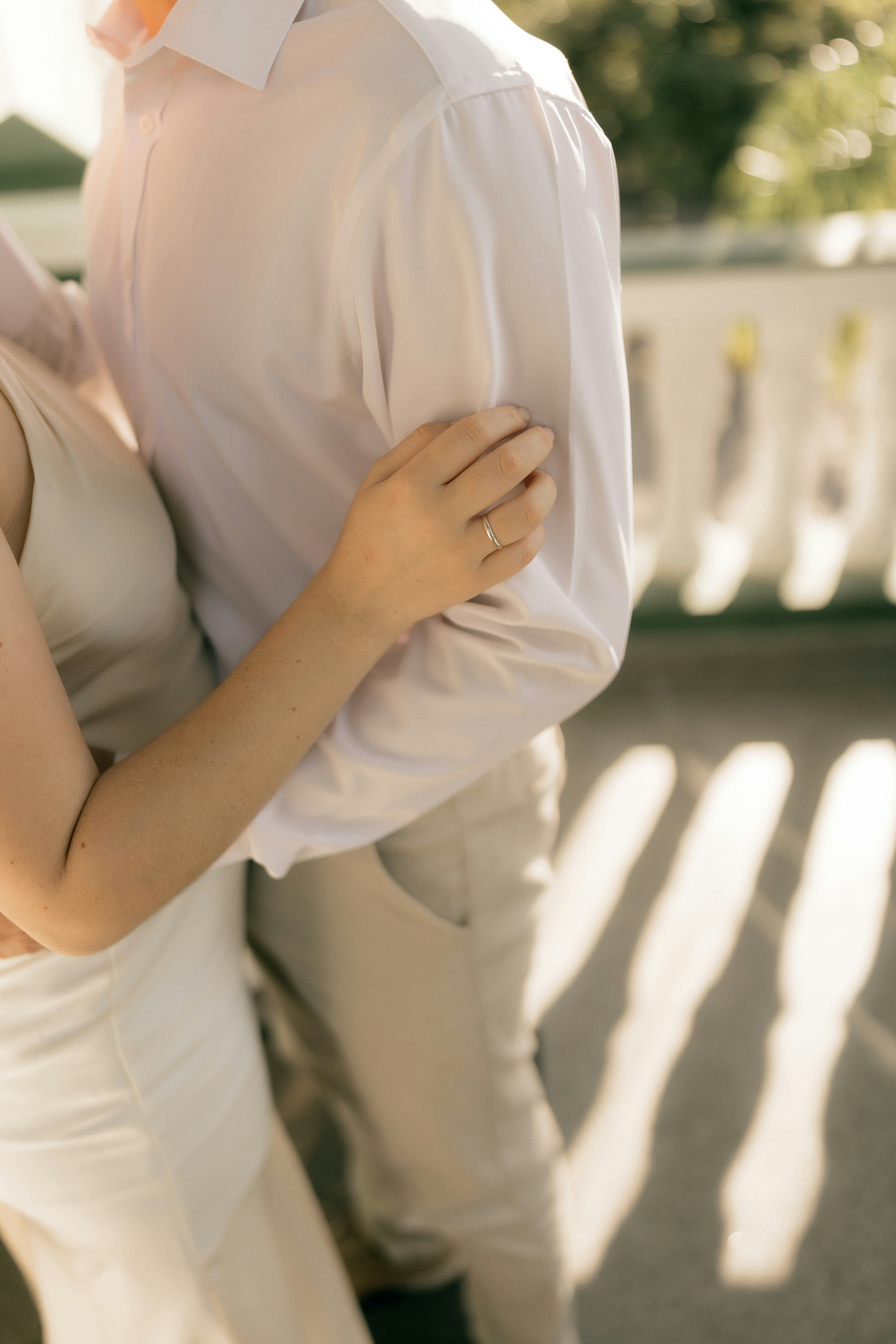 Intimate embrace in soft sunset light