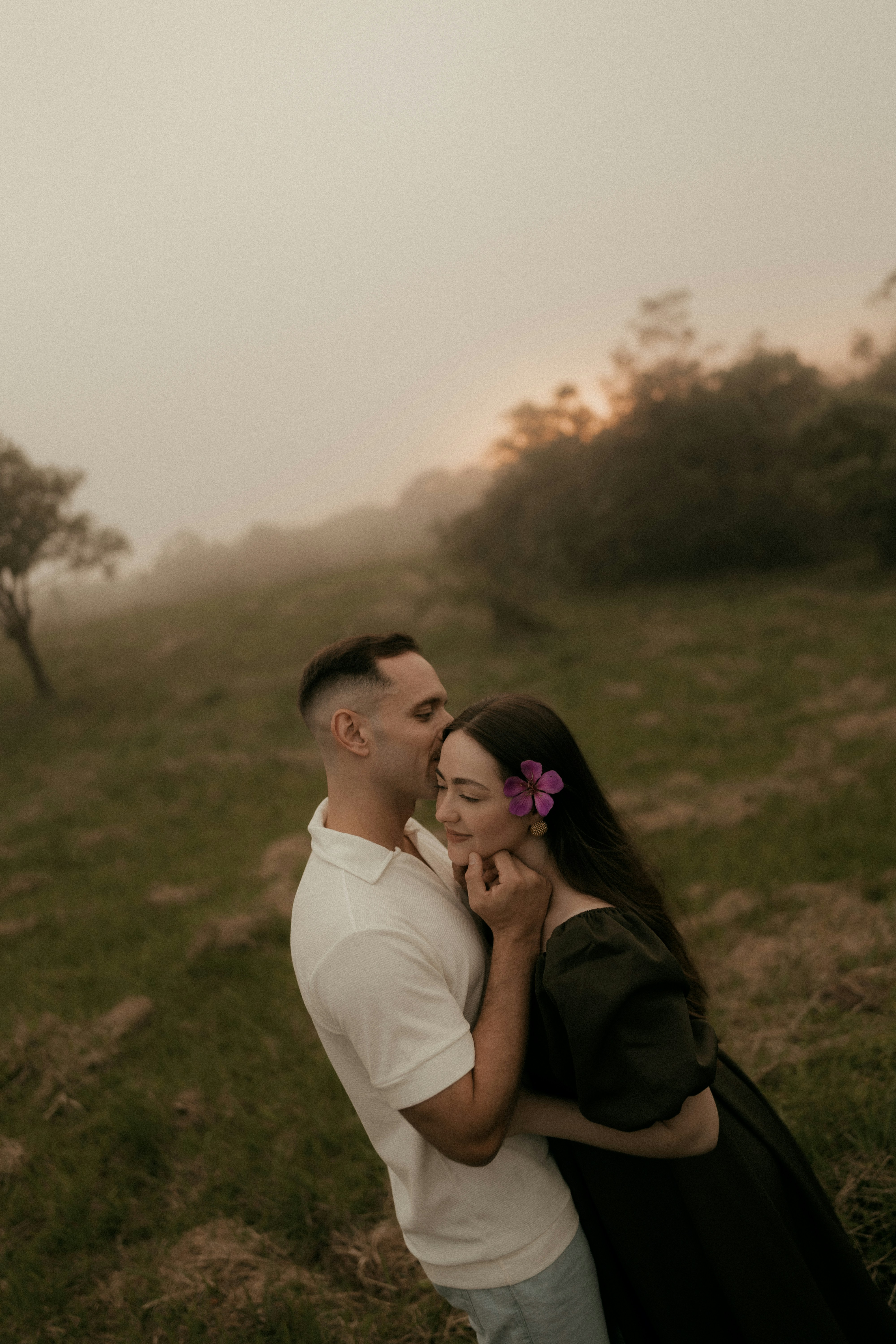 Whispers in the Field: A Quiet Embrace at Dusk